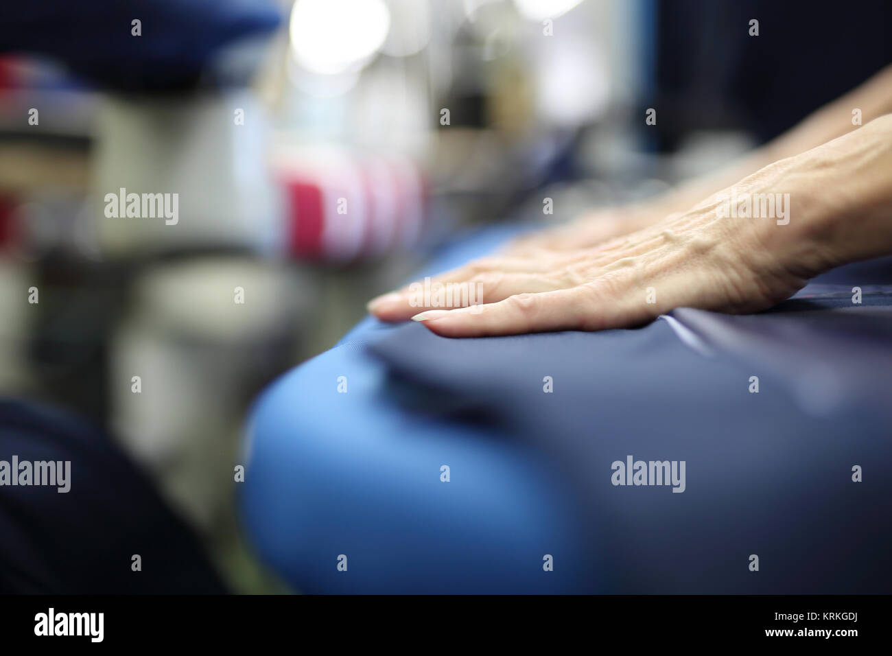 clothing industry. ironing steam. presser in sewing clothes pressed ...