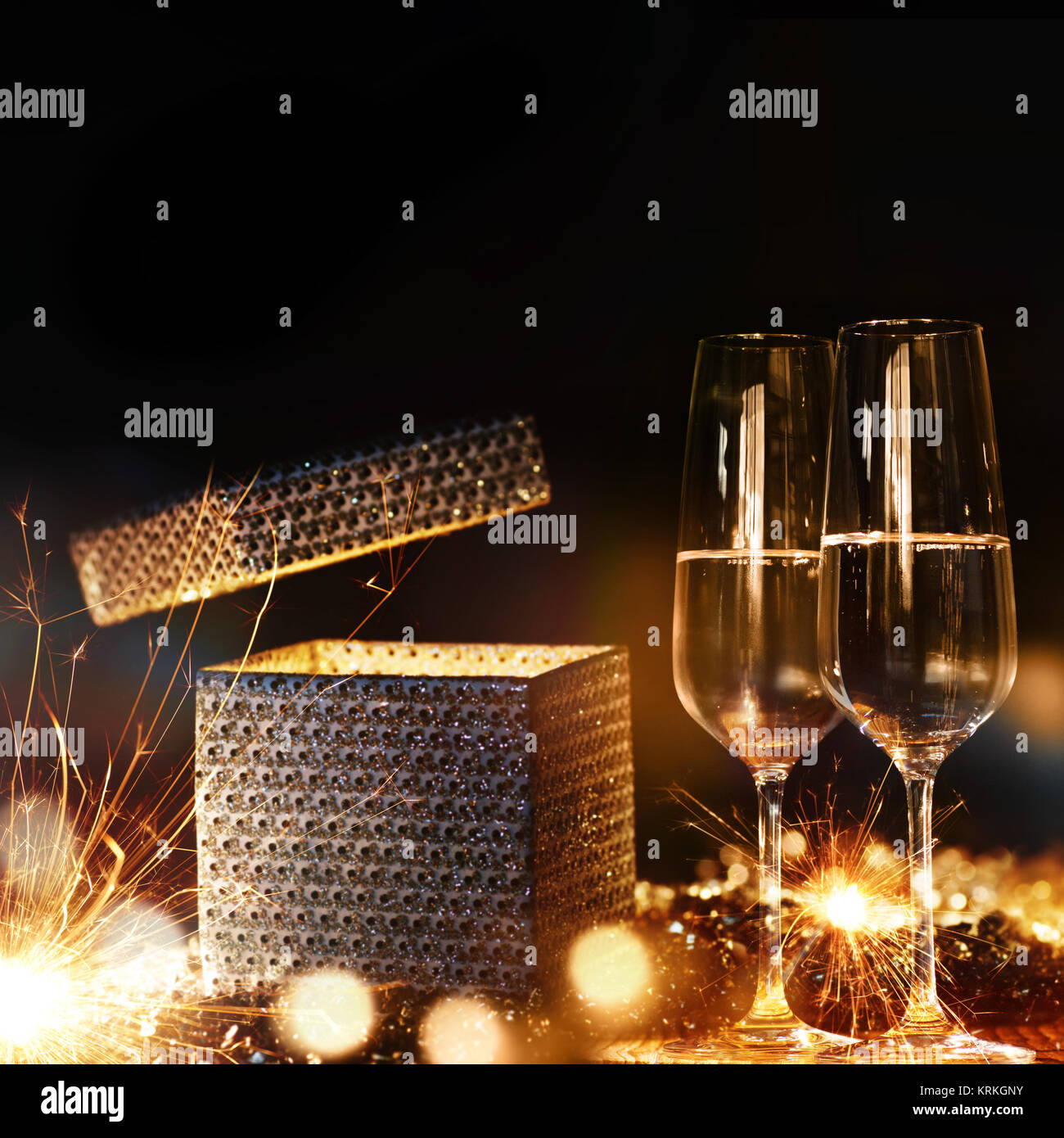 Magical gift with champagne and sparkling Background Stock Photo - Alamy