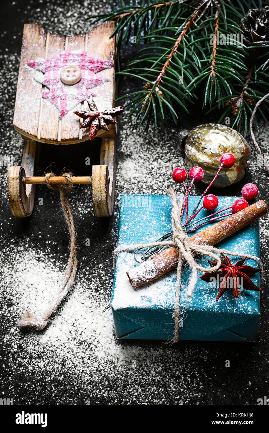 Box with Christmas present and Santa Claus's sledge Stock Photo - Alamy