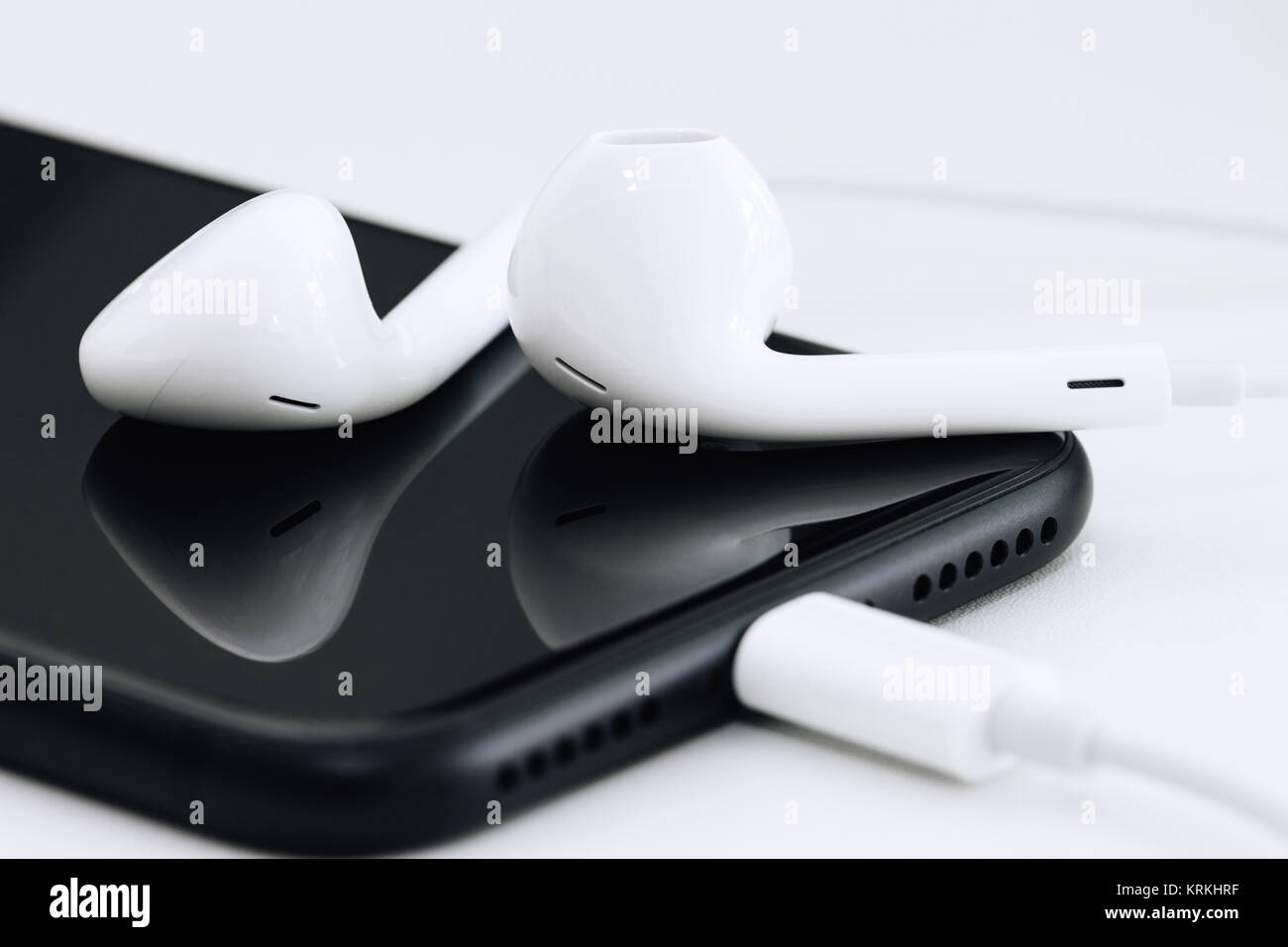 close-up phone and headphone on table Stock Photo - Alamy