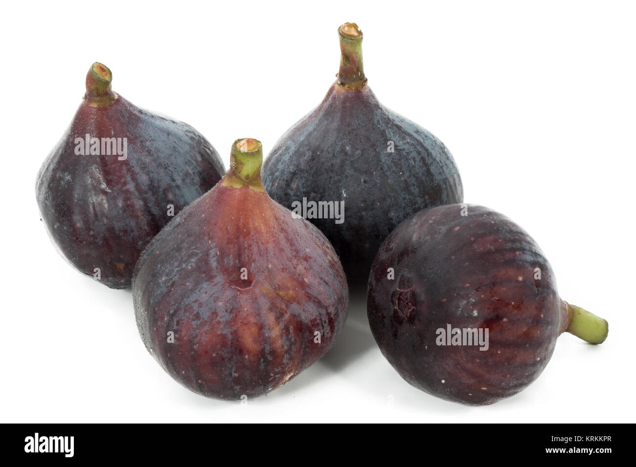 some figs isolated on white background Stock Photo - Alamy