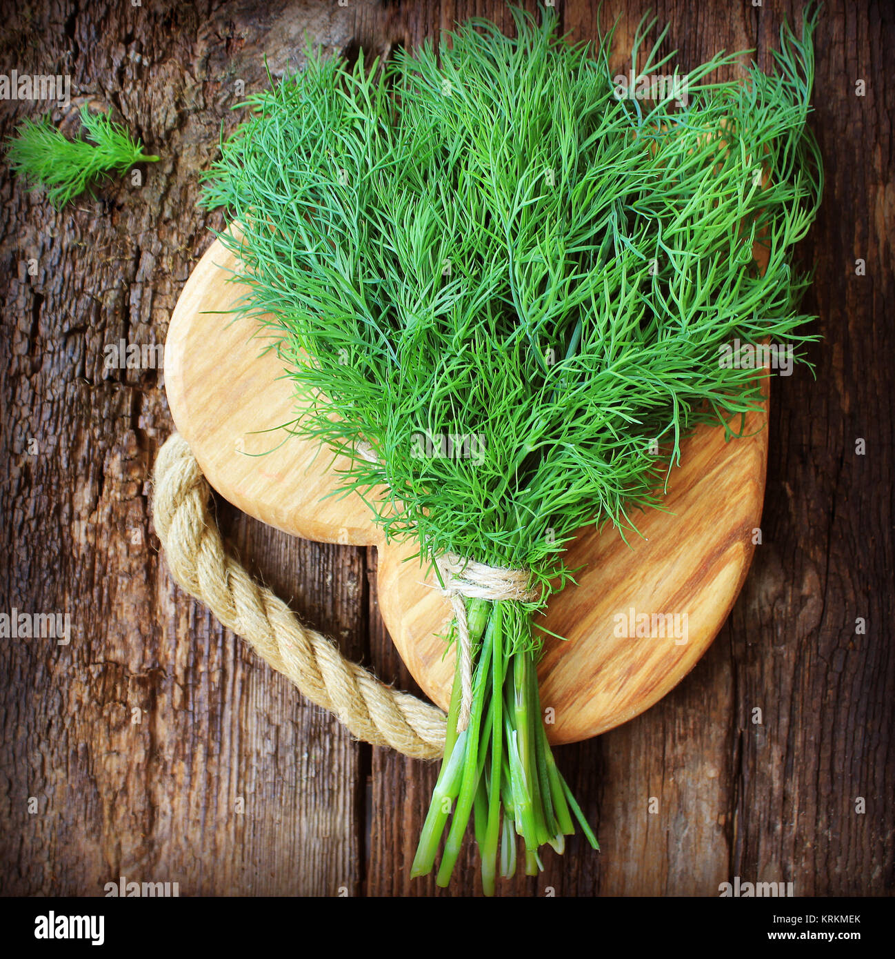 Fresh organic dill for cook put on wooden cutting board Stock Photo - Alamy
