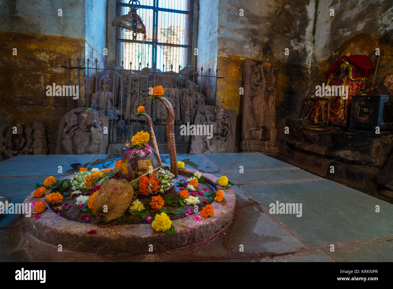 Shiva Lingam temple interior ornate with flowers and colors with ...