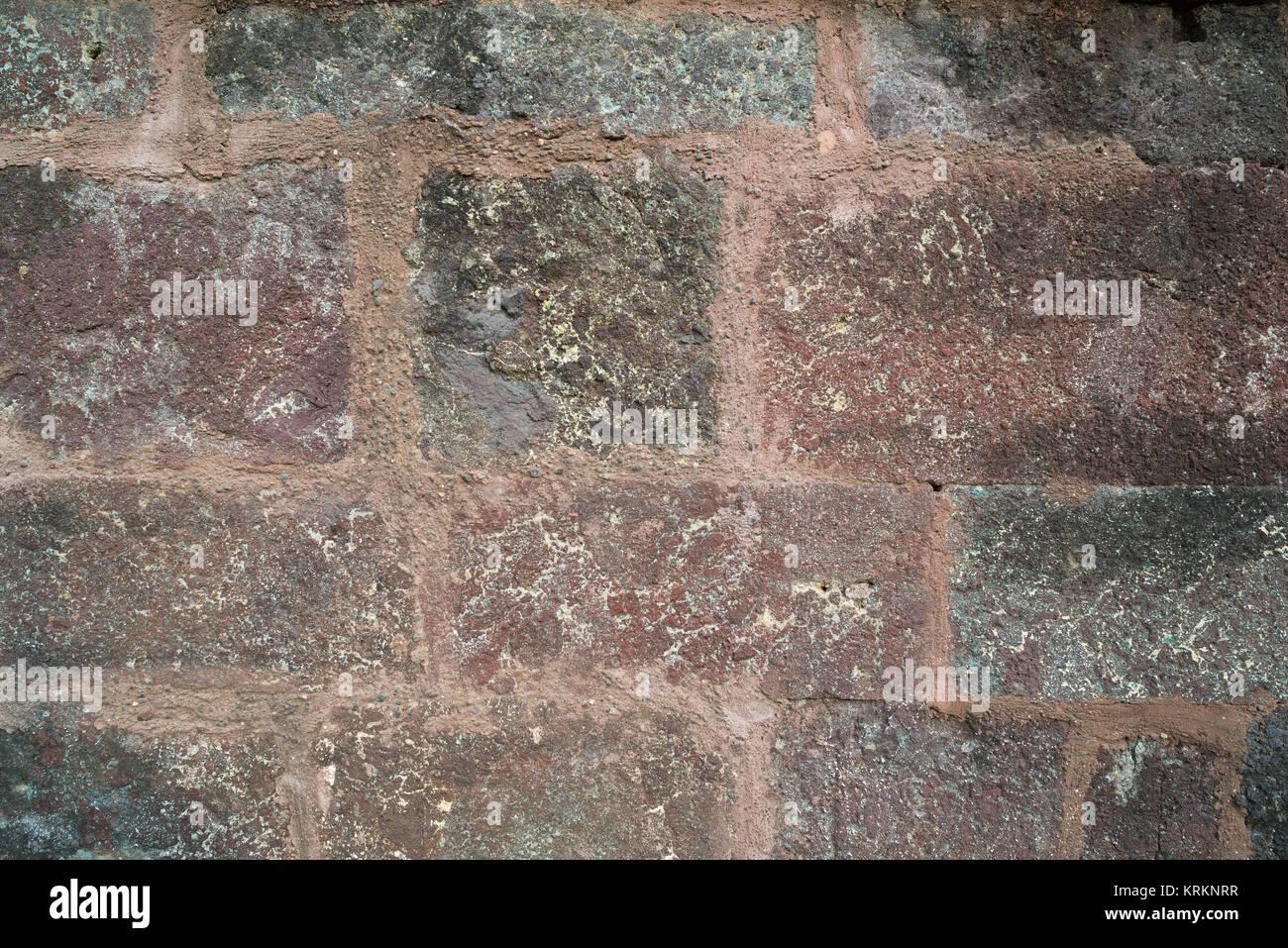 Stone wall, weathered and ruined, volcanic rocks. Beautiful background ...