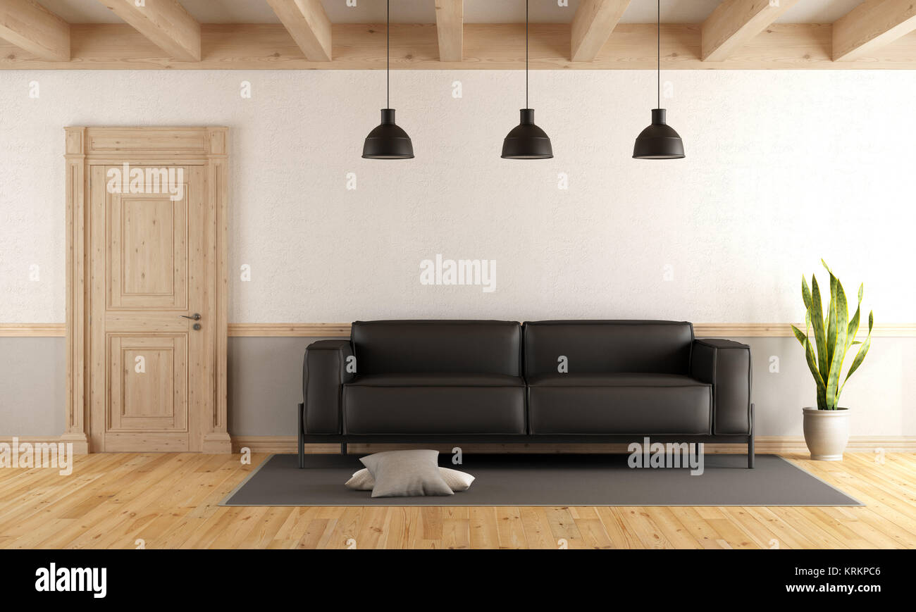 living room with wooden door and sofa Stock Photo - Alamy
