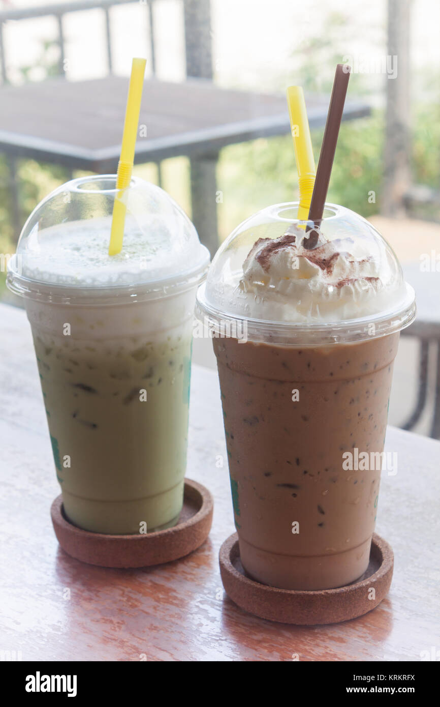 Iced coffee with iced green tea in coffee shop Stock Photo - Alamy