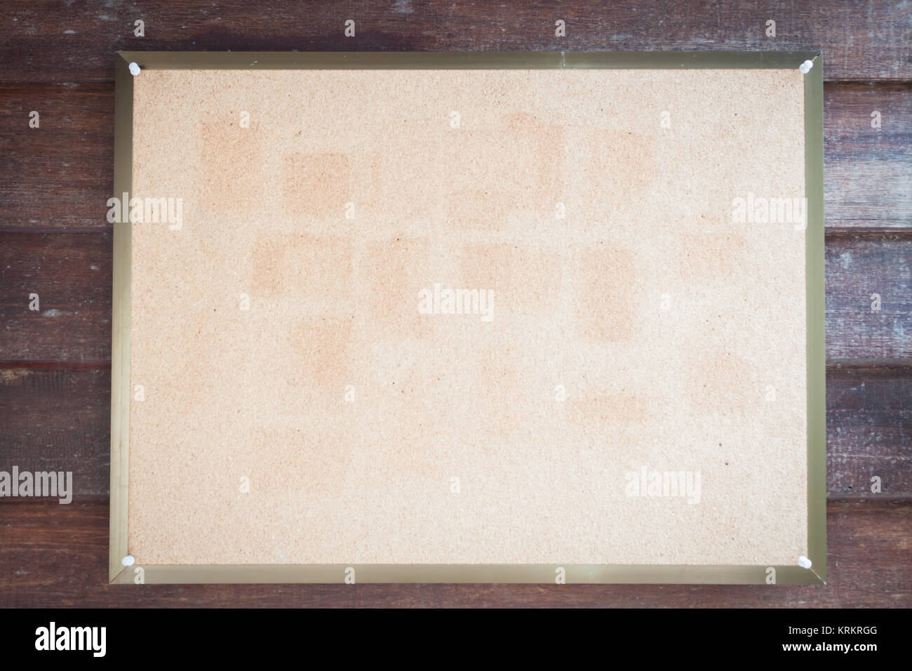 Blank board on wooden wall Stock Photo - Alamy