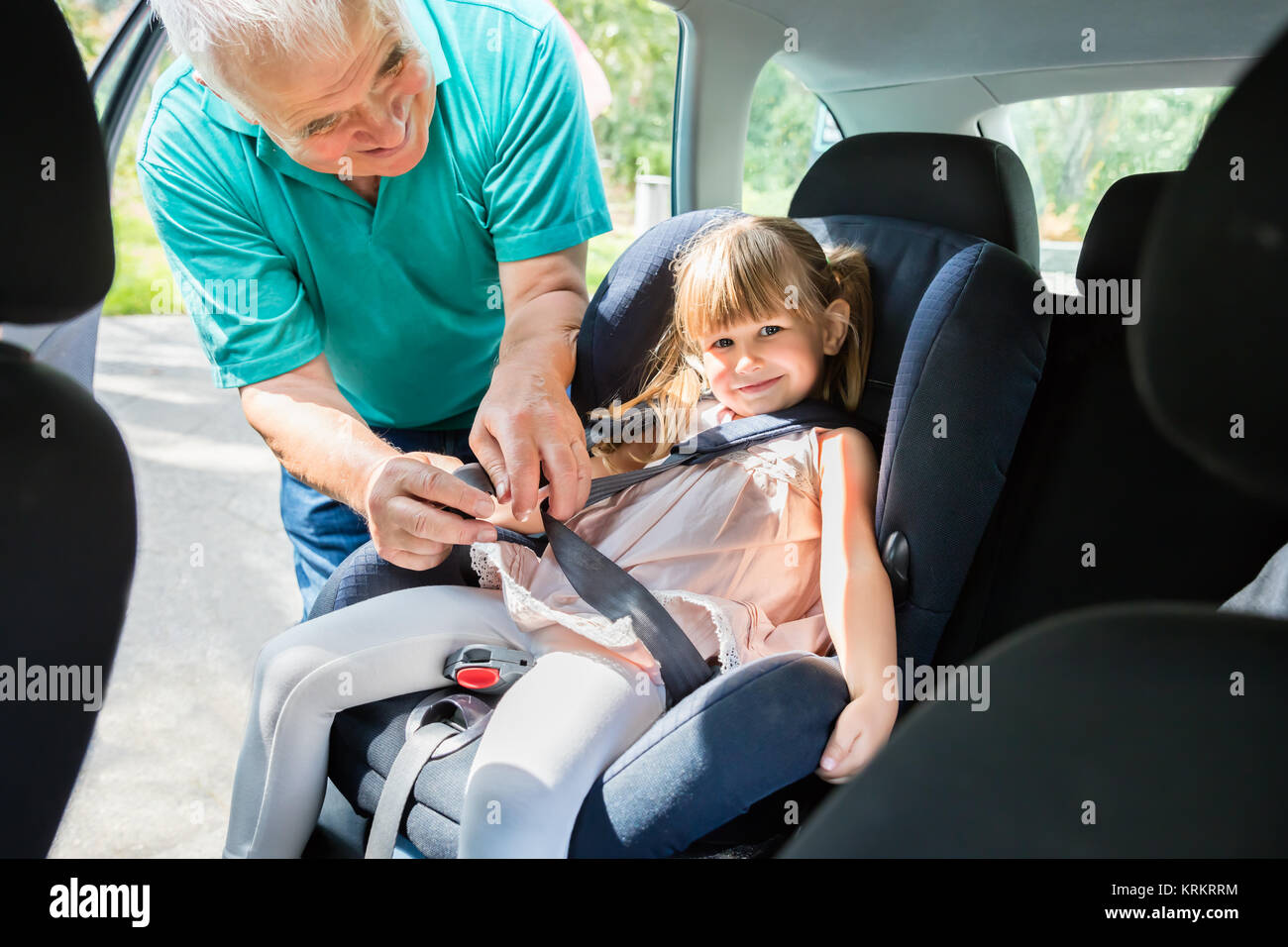 Buckling up in car hi-res stock photography and images - Alamy