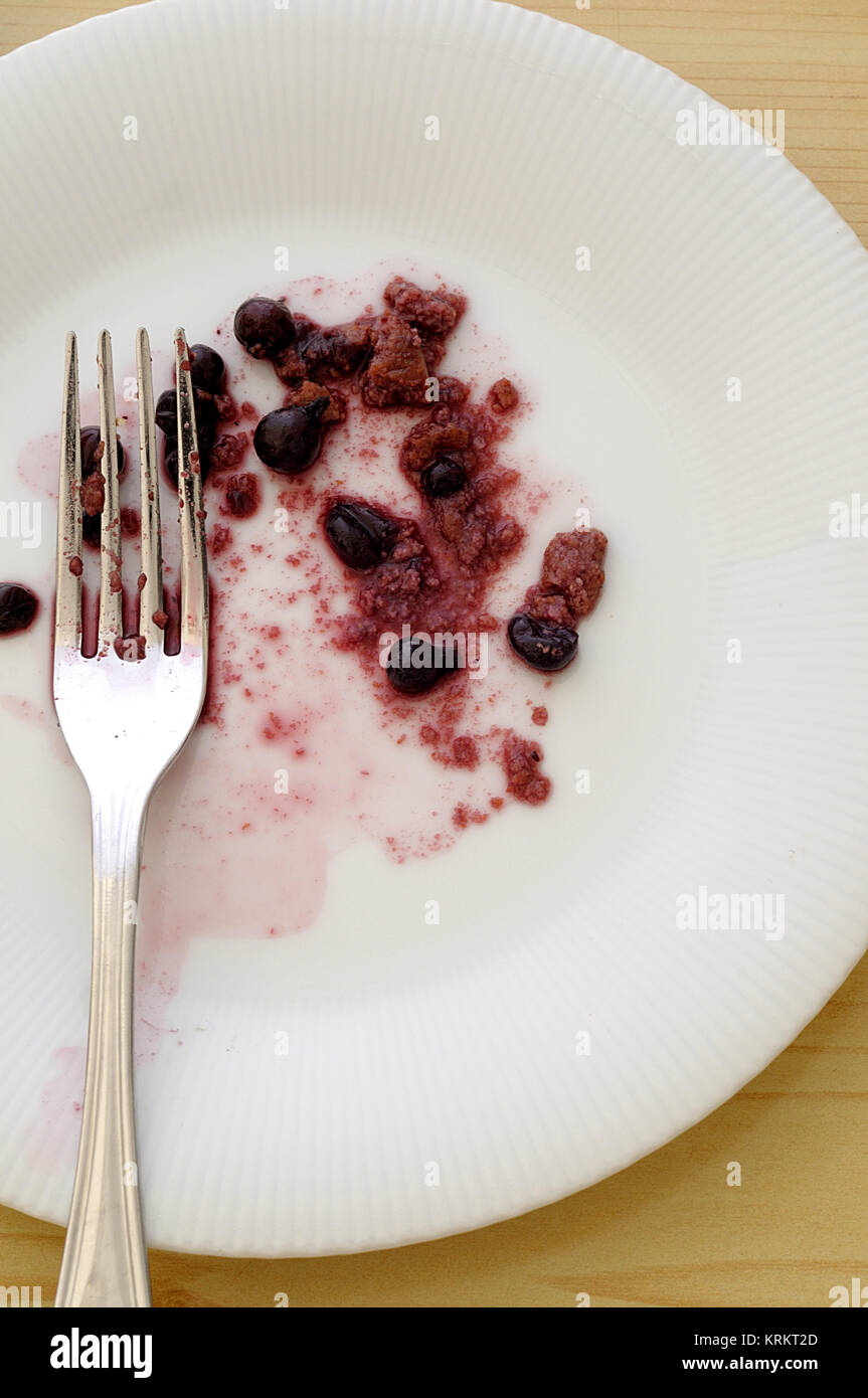 top view of leftovers of a cake in a dish, vertical, close up Stock ...
