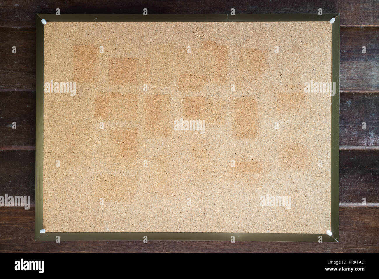 Blank cork board on wooden wall Stock Photo - Alamy