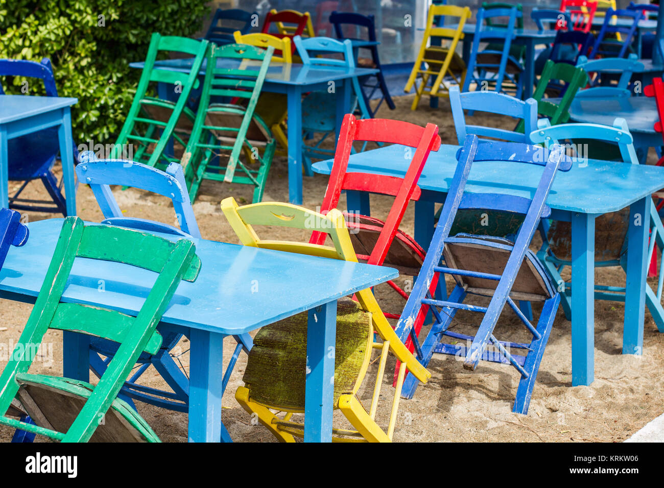 Colorful chairs and table Stock Photo - Alamy