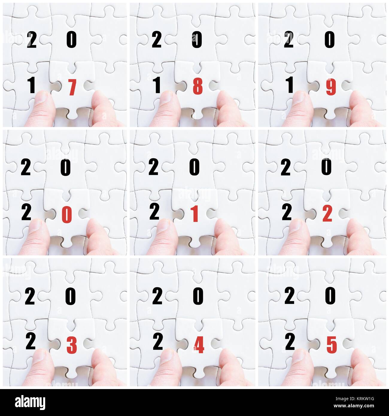 Hand of business man completing the puzzle Stock Photo - Alamy