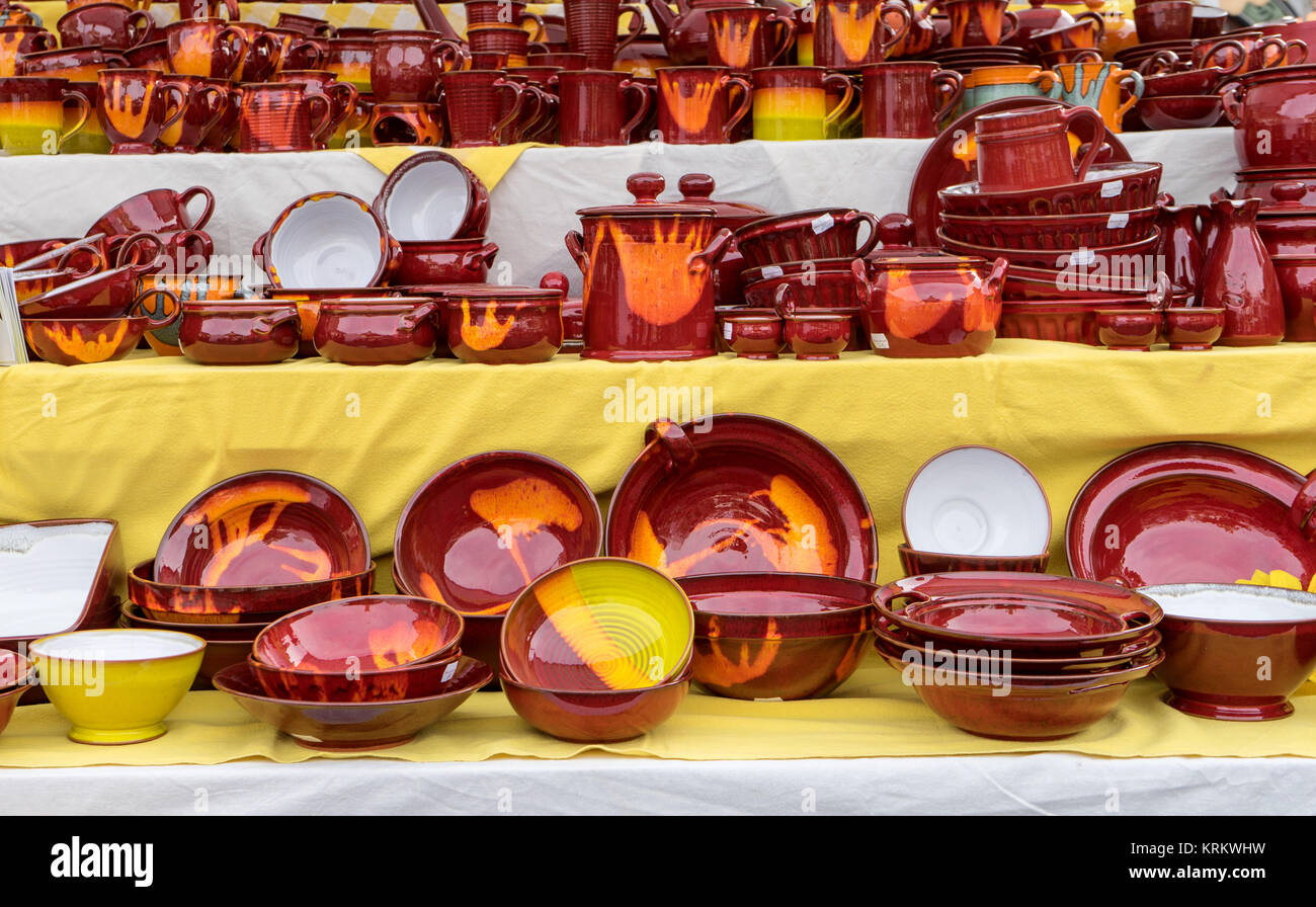 Market stand with red pottery Stock Photo - Alamy