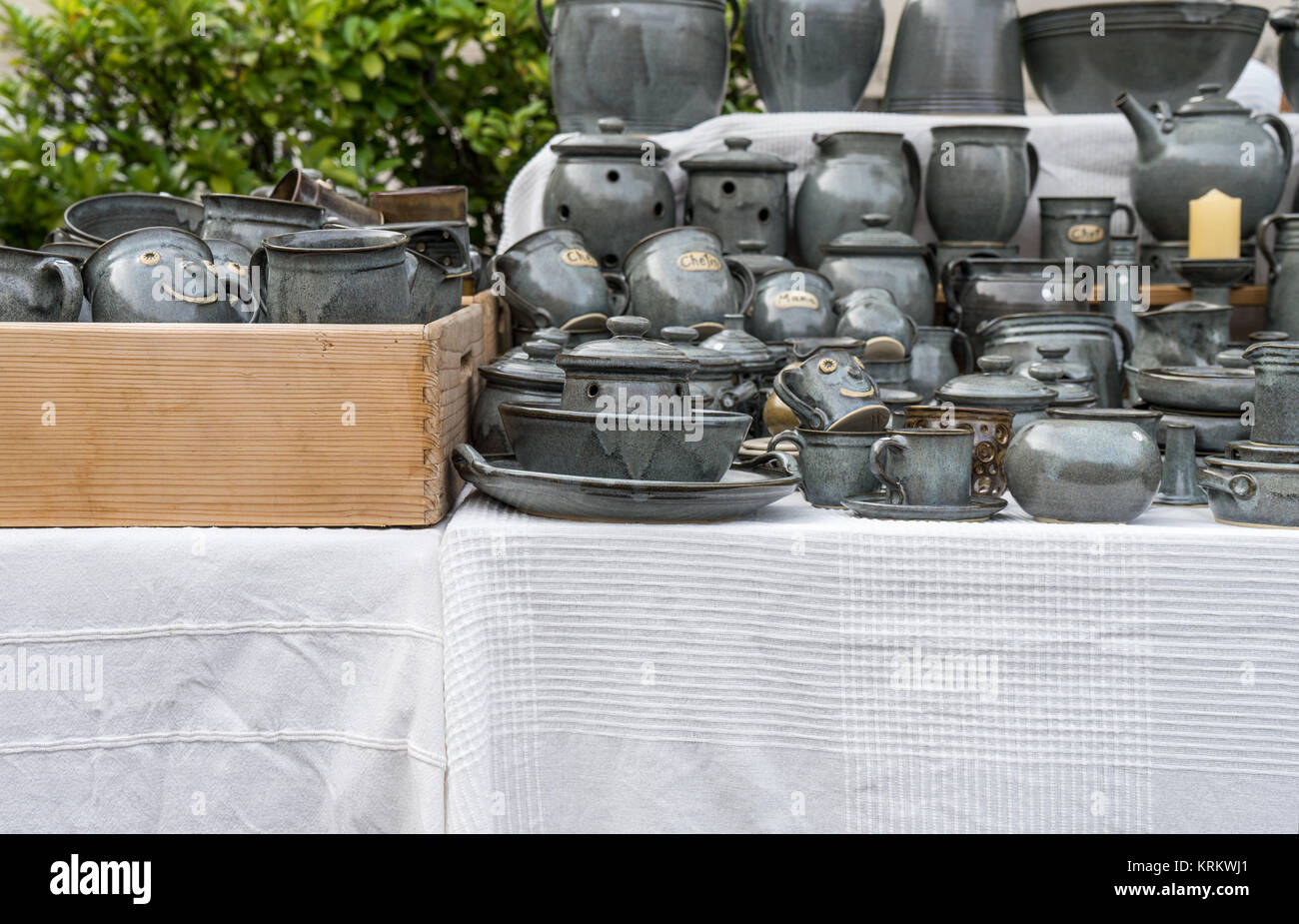 Market stand with gray pottery Stock Photo - Alamy