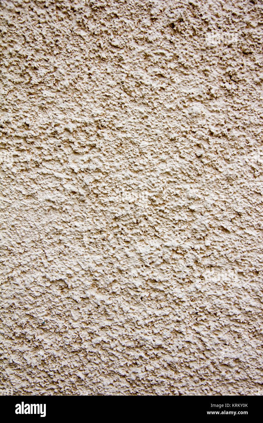 beige facade plaster on a house wall Stock Photo - Alamy
