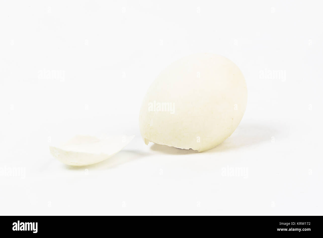 Egg shell on white background Stock Photo - Alamy