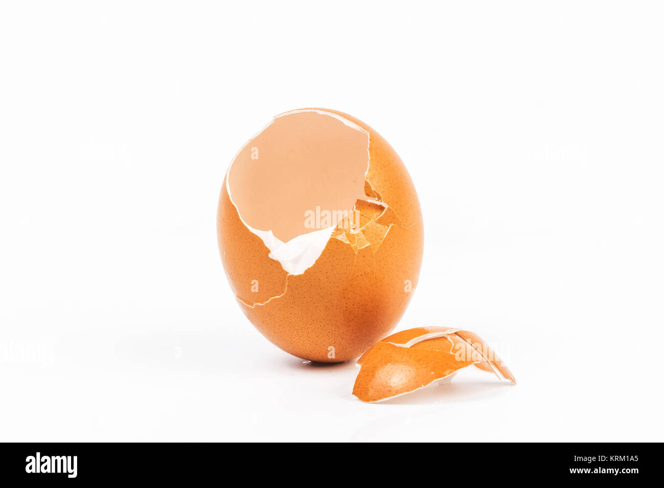Egg shell on white background Stock Photo - Alamy