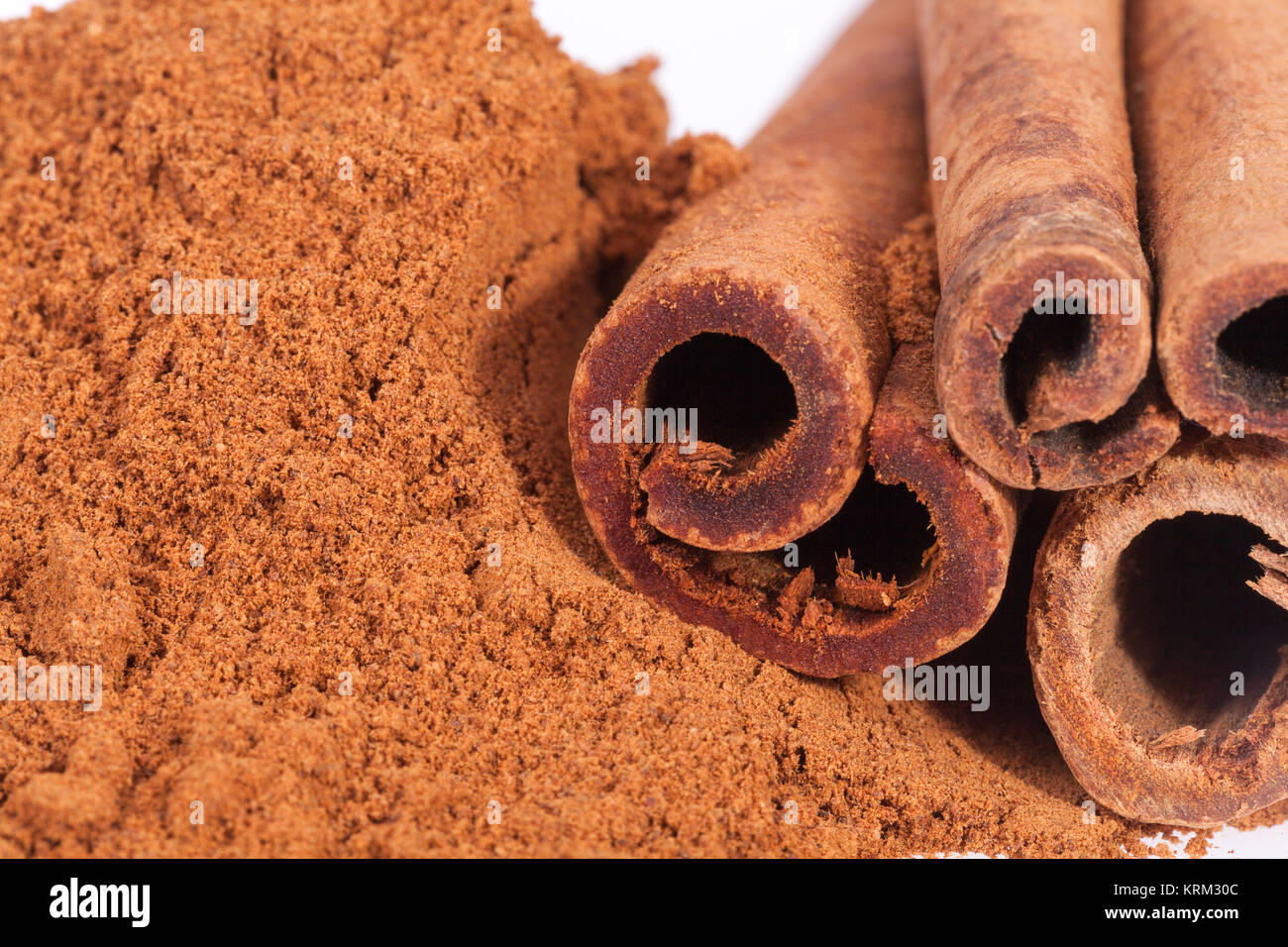 Cinnamon sticks and powder isolated on white background, close up Stock ...