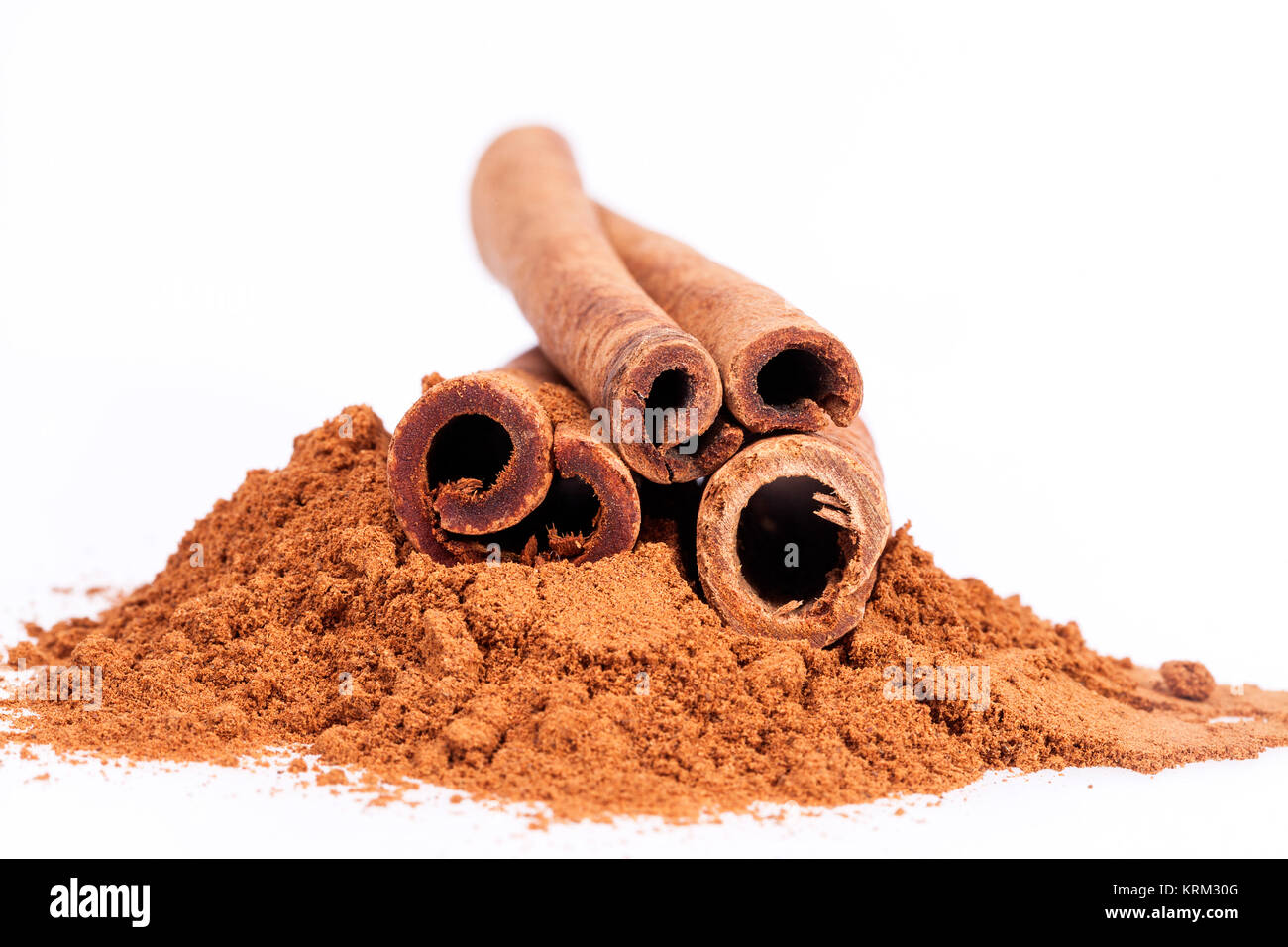 Cinnamon sticks and powder isolated on white background, close up Stock ...
