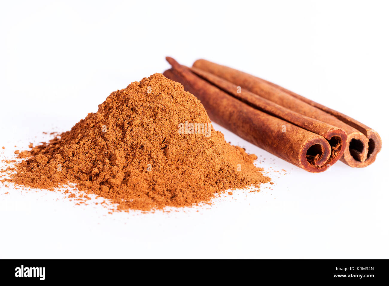 Cinnamon sticks and powder isolated on white background, close up Stock ...
