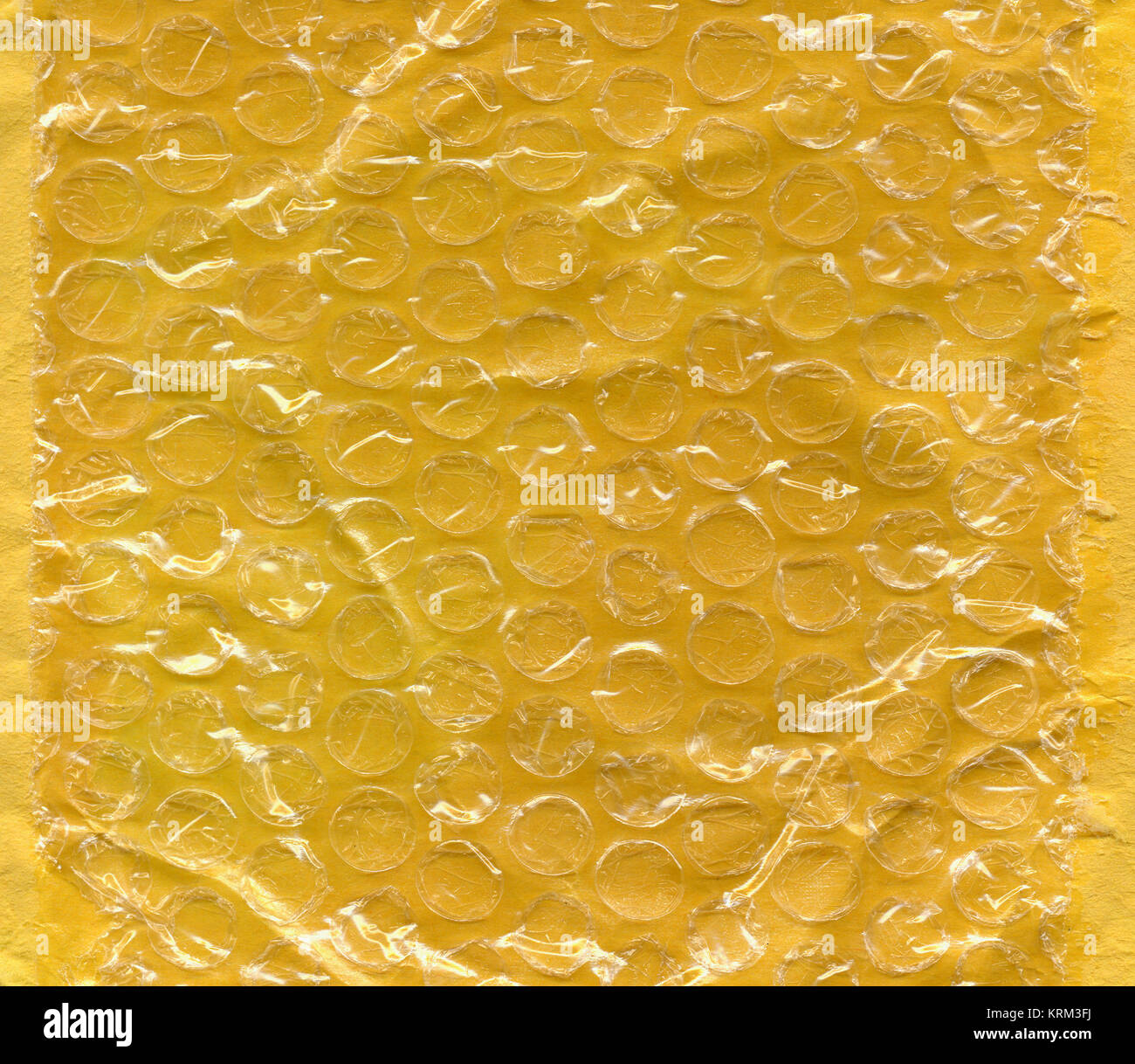 Yellow bubble wrap texture background Stock Photo - Alamy