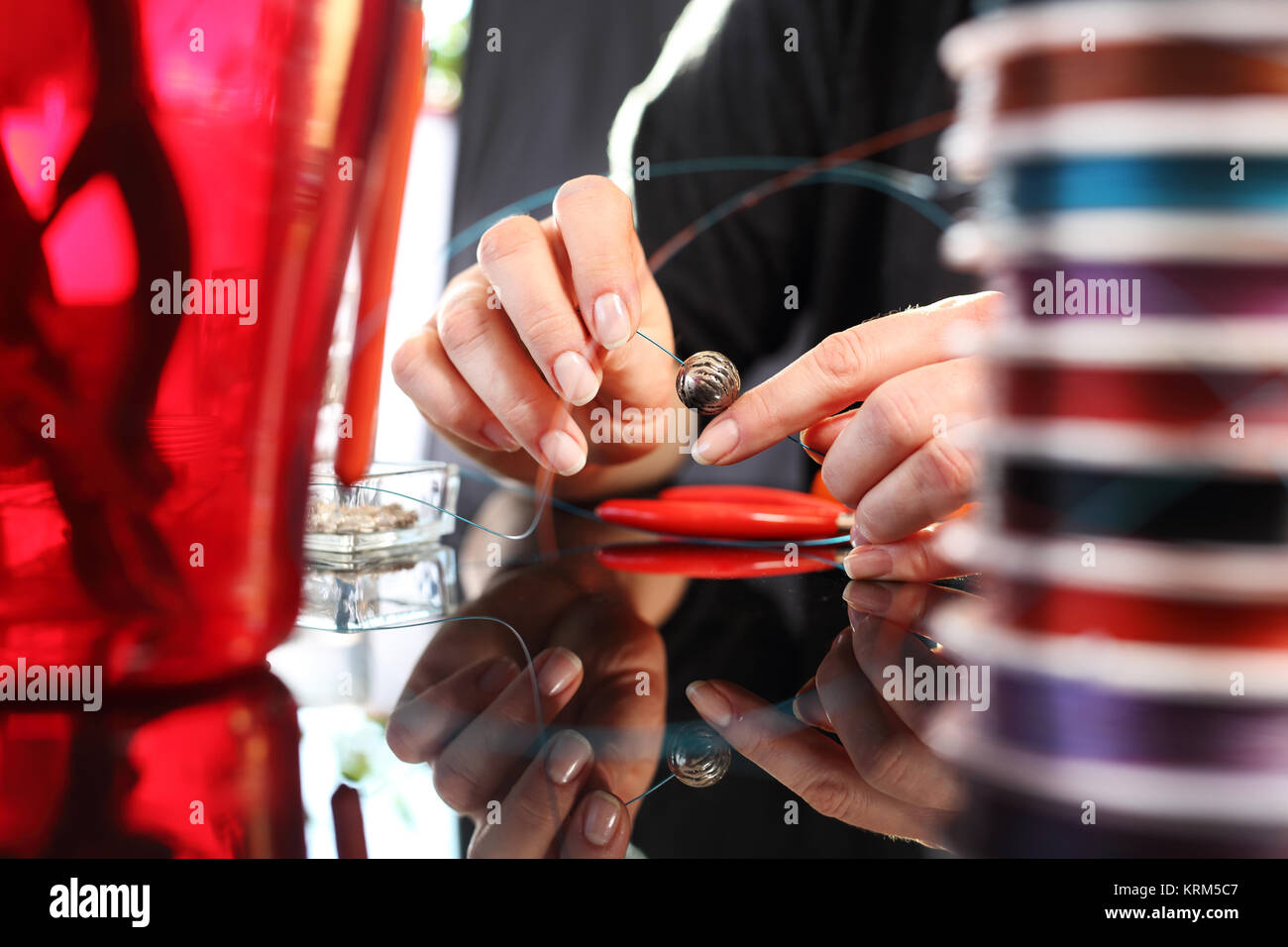 Threading beads hi-res stock photography and images - Alamy