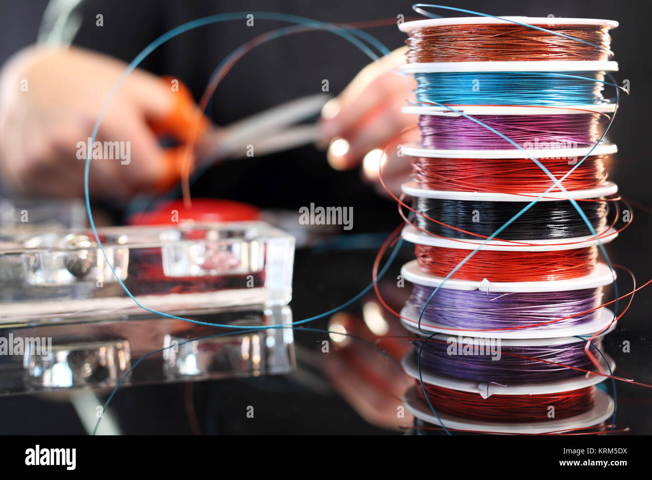 Threading beads hi-res stock photography and images - Alamy