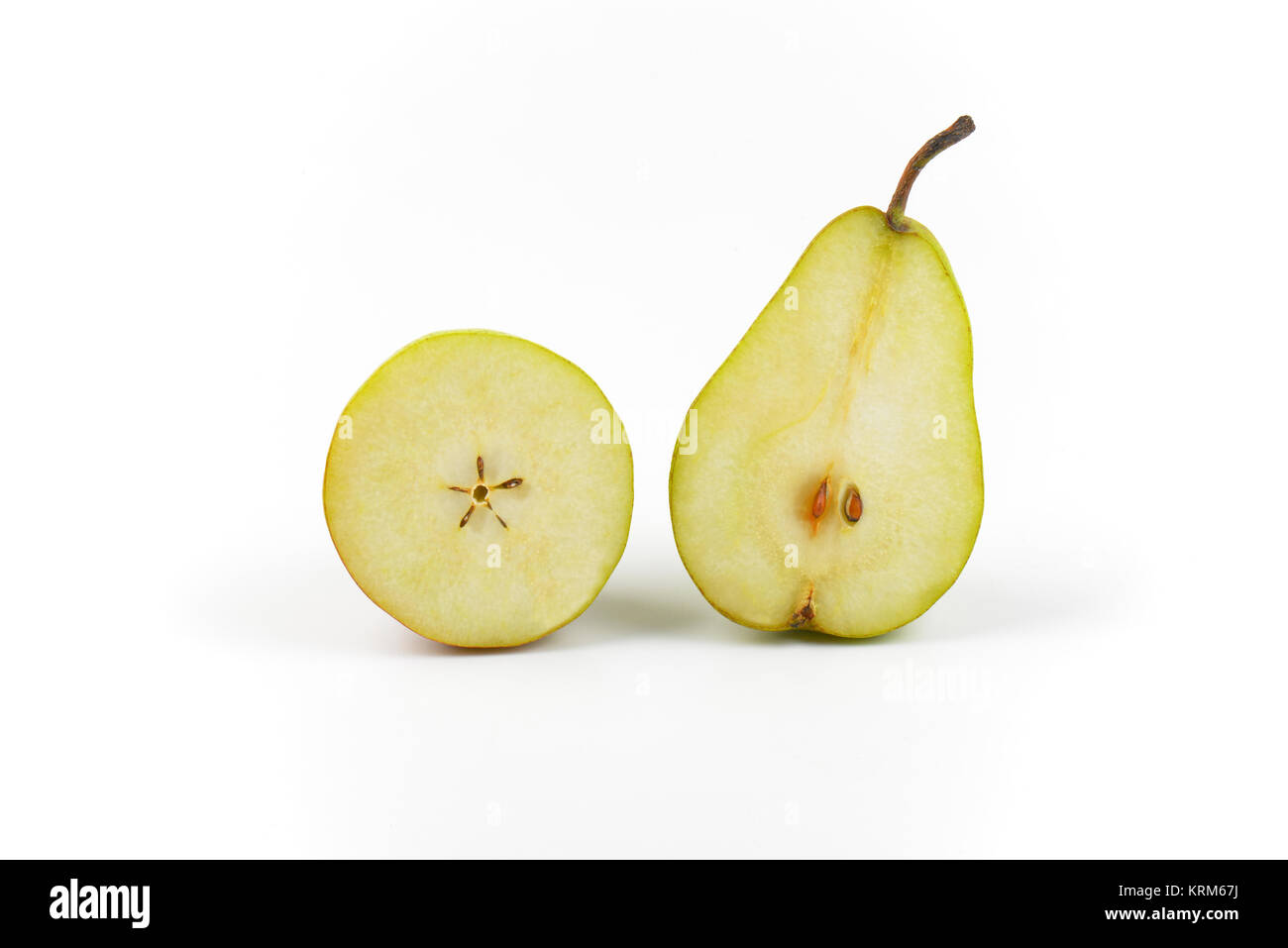 Halves ripe juicy pear Cut Out Stock Images & Pictures - Alamy