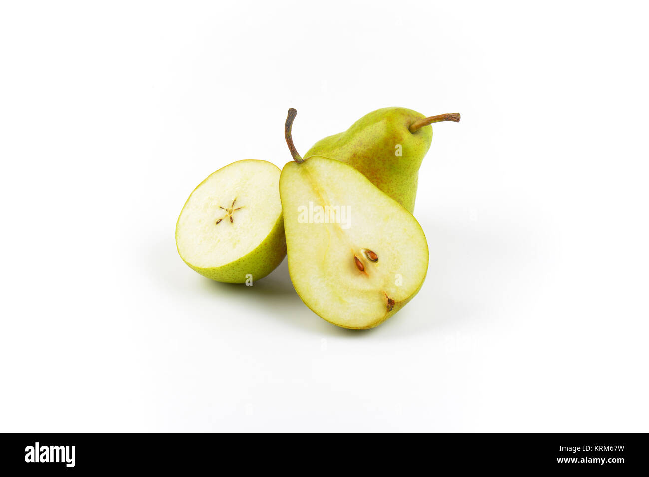 whole and halved pears Stock Photo - Alamy