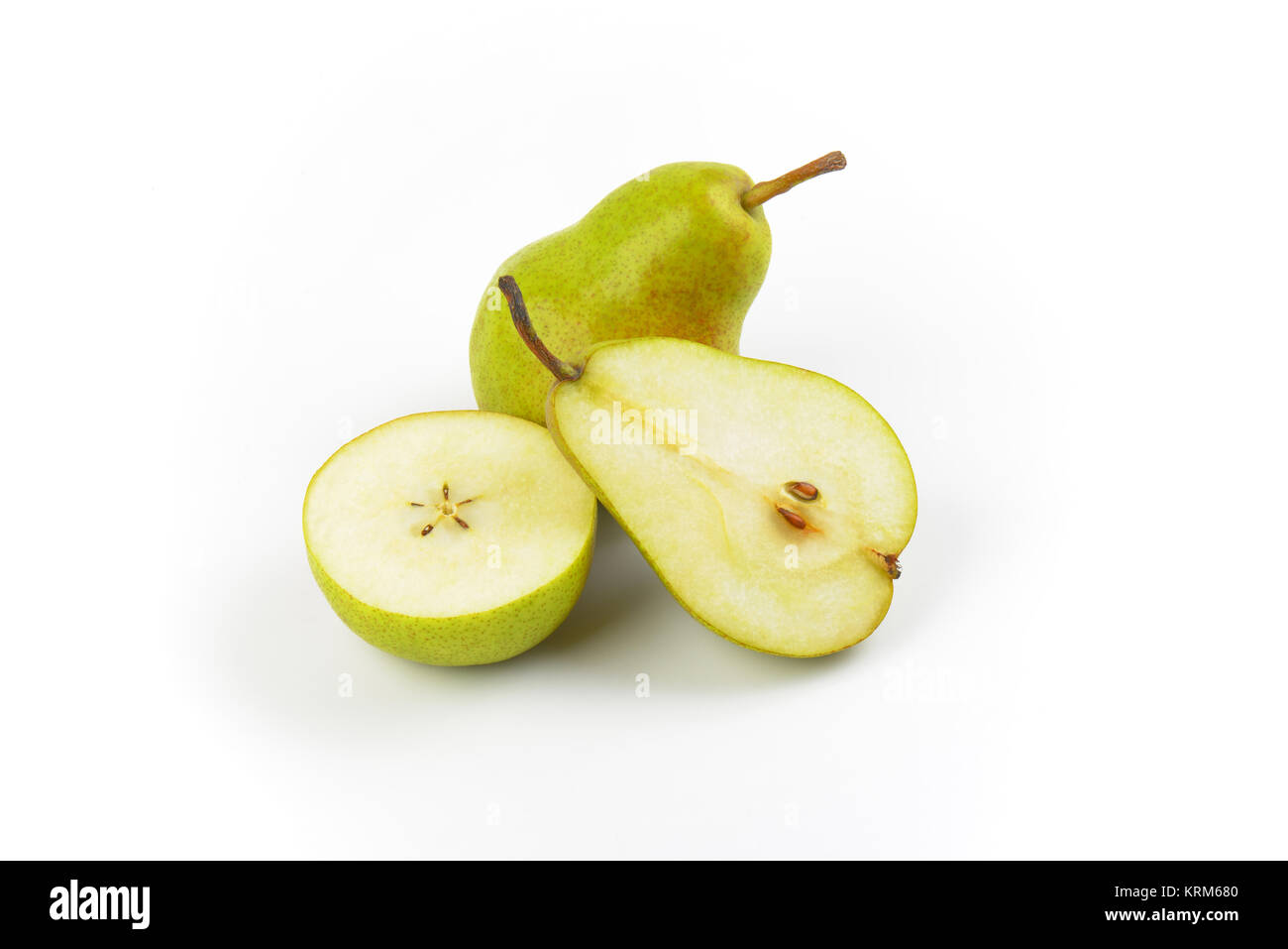 whole and halved pears Stock Photo - Alamy