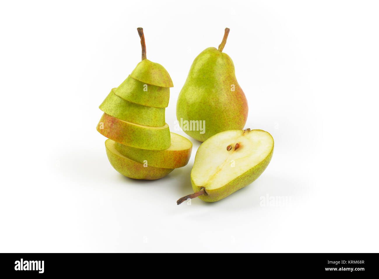 whole, halved and sliced pears Stock Photo - Alamy