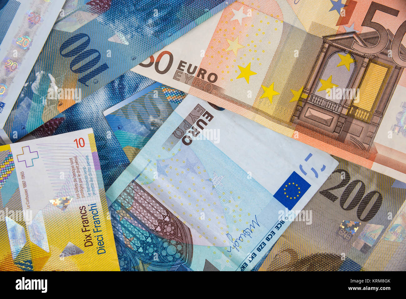 Background made of euro and swiss franc banknotes Stock Photo - Alamy