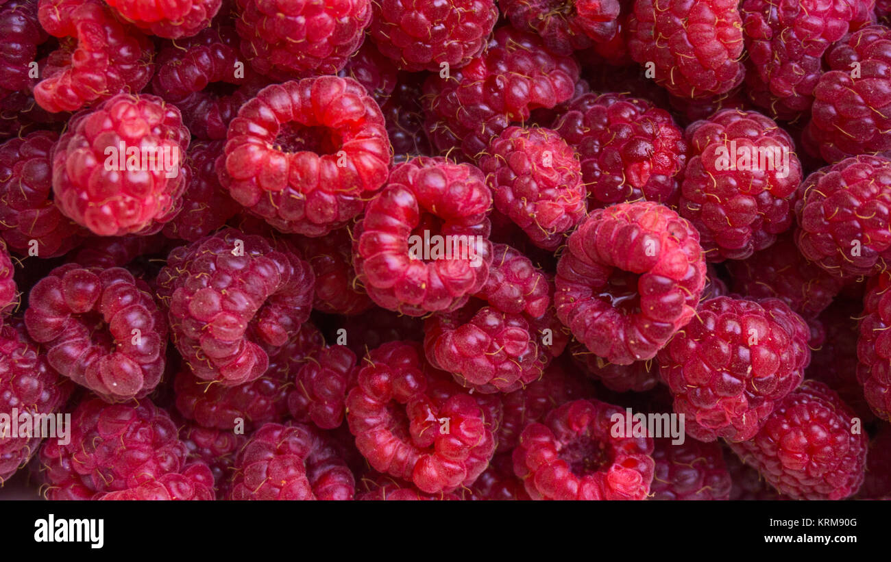 Fresh raspberries background Stock Photo - Alamy