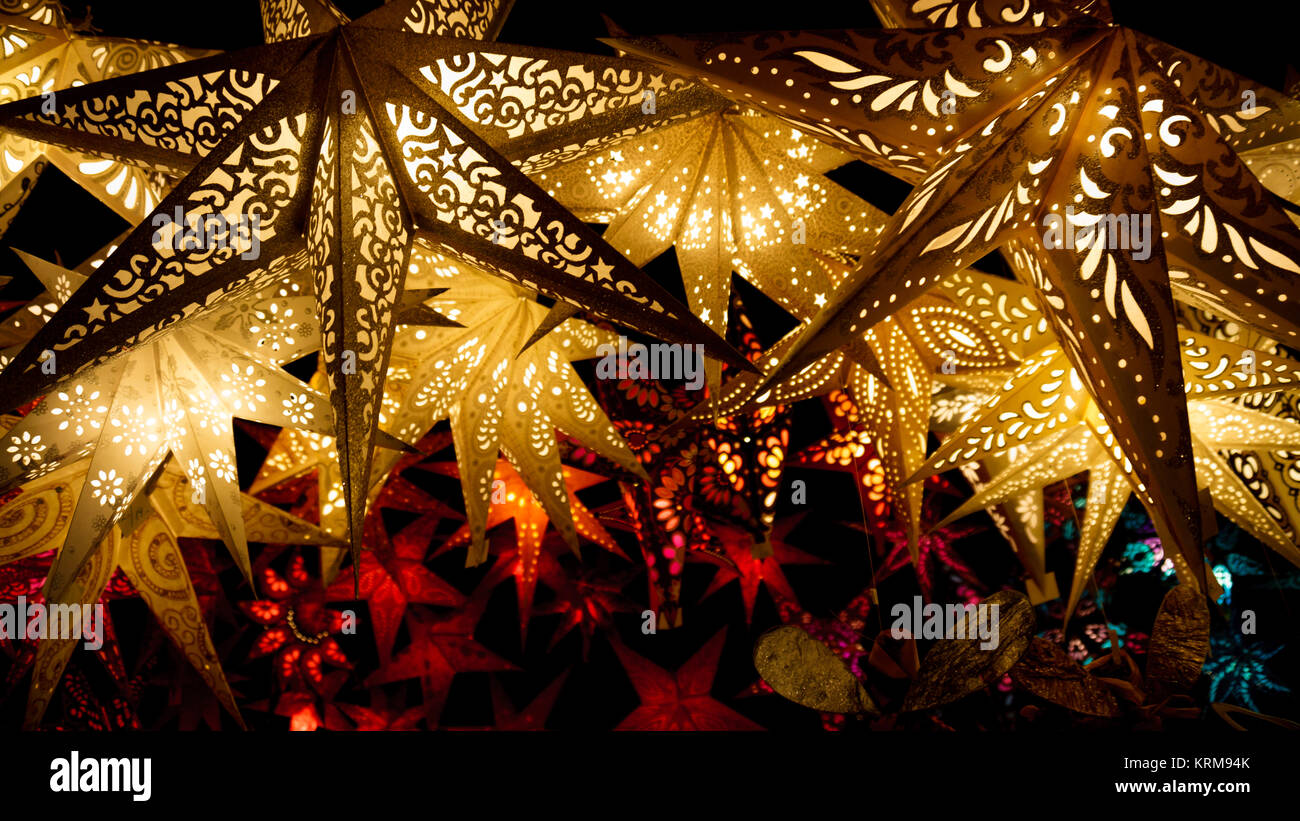 Colorful Christmas stars. A background of star lanterns Stock Photo - Alamy