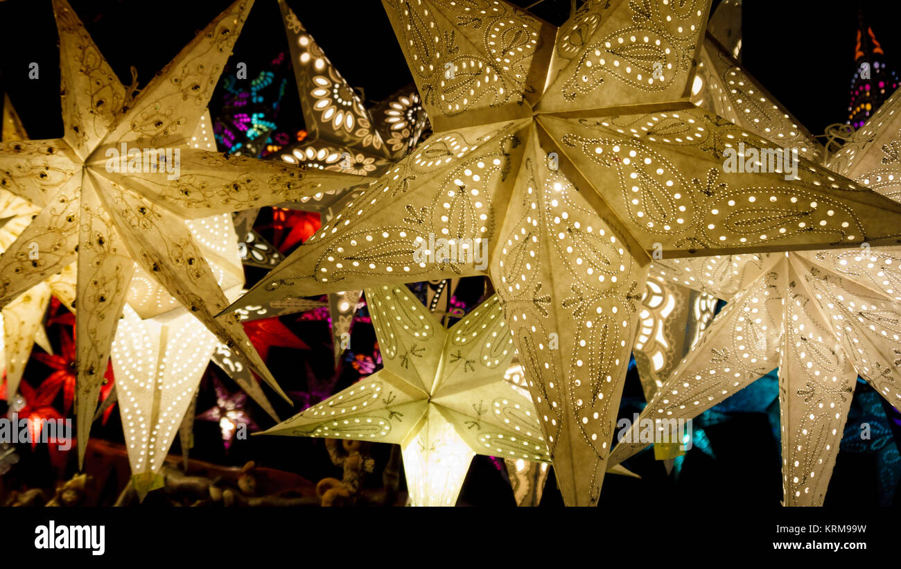 Colorful Christmas stars. A background of star lanterns Stock Photo - Alamy