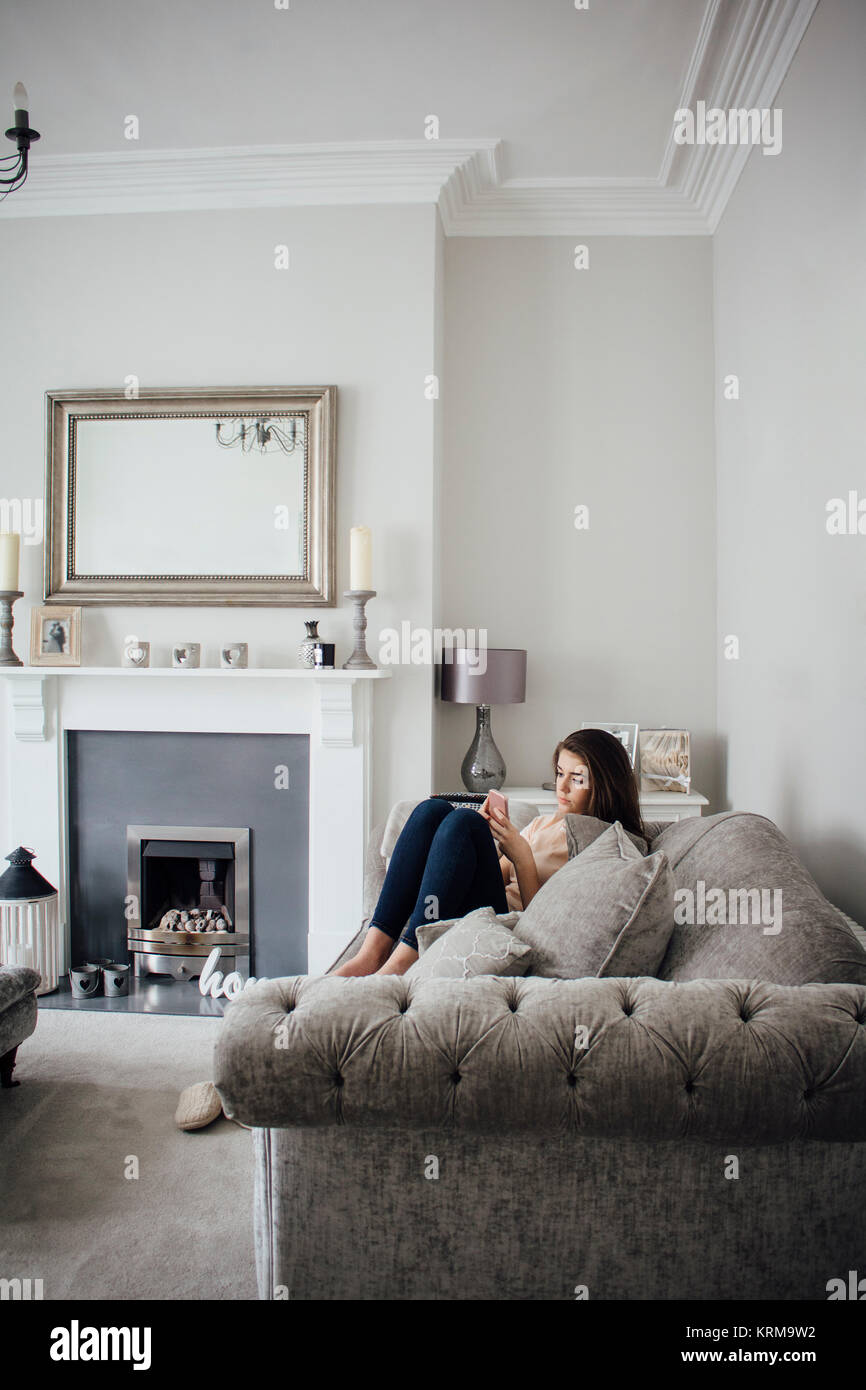 Teen Texting at Home Stock Photo - Alamy