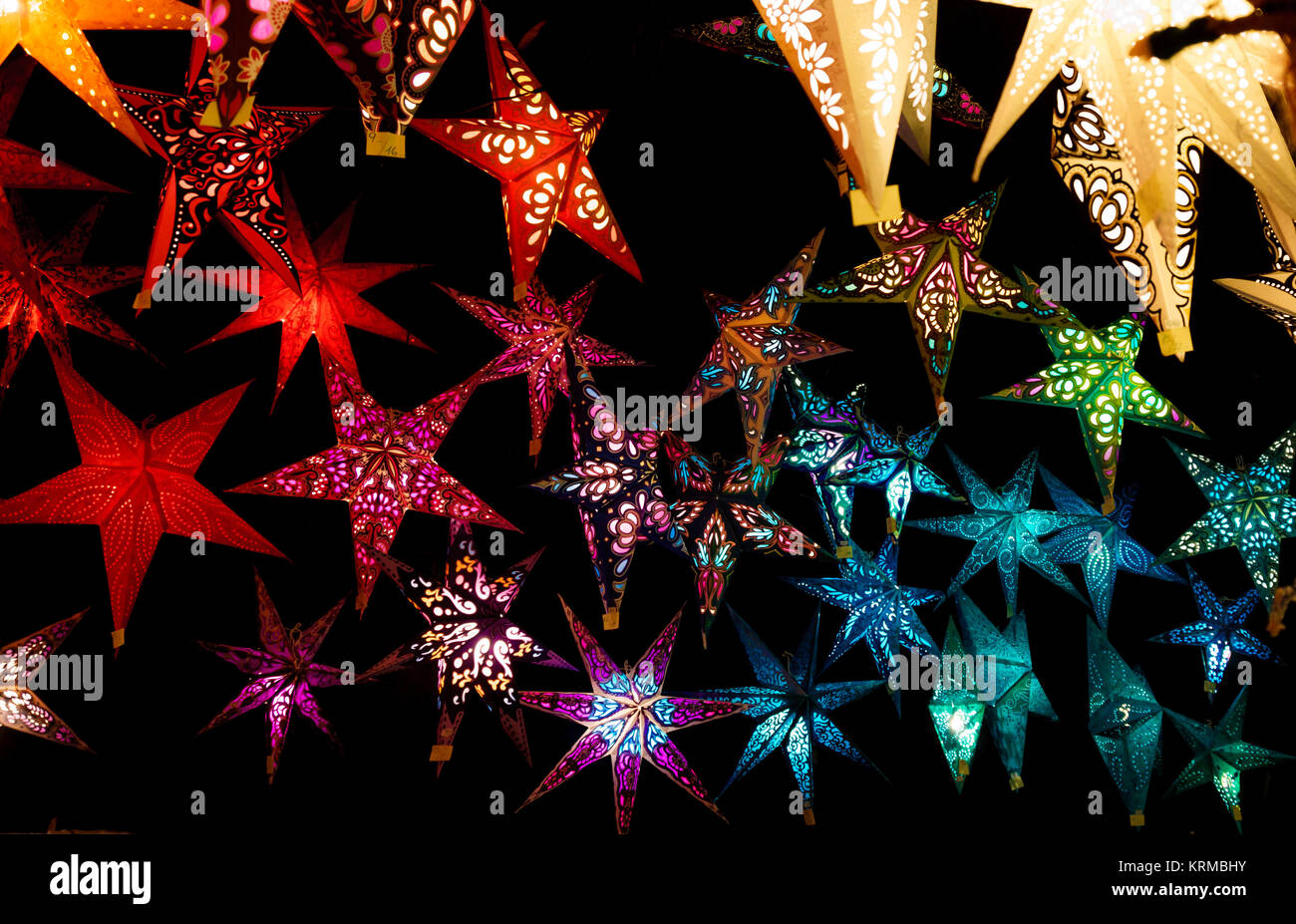 Colorful Christmas stars. A background of star lanterns Stock Photo - Alamy