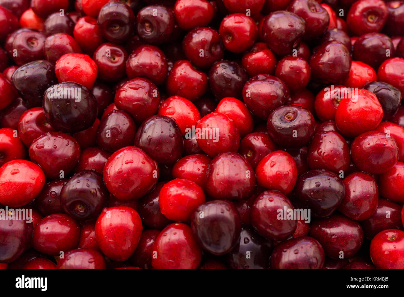 Sweet cherry. cherry background Stock Photo - Alamy
