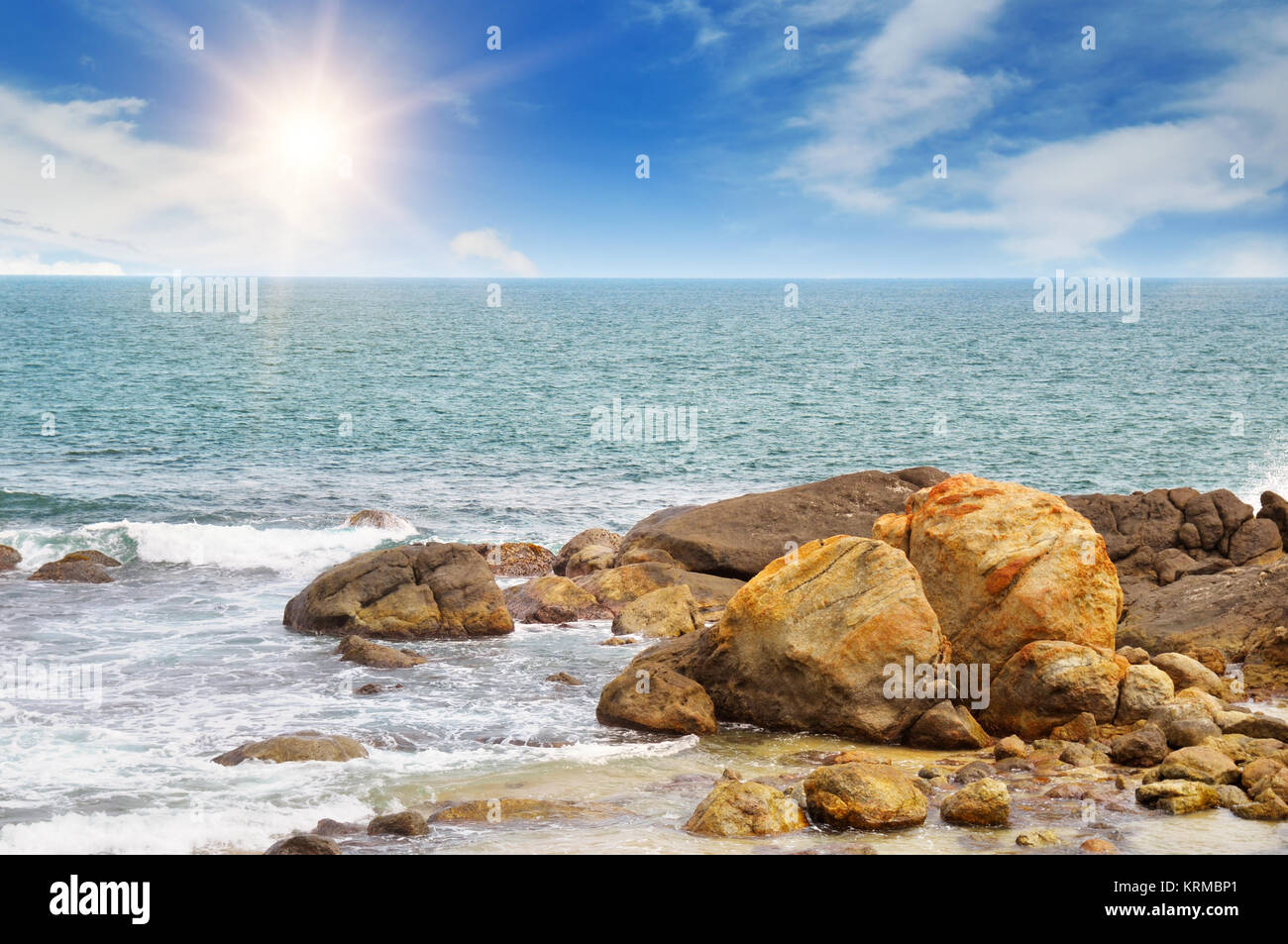 ocean, picturesque beach and blue sky Stock Photo - Alamy