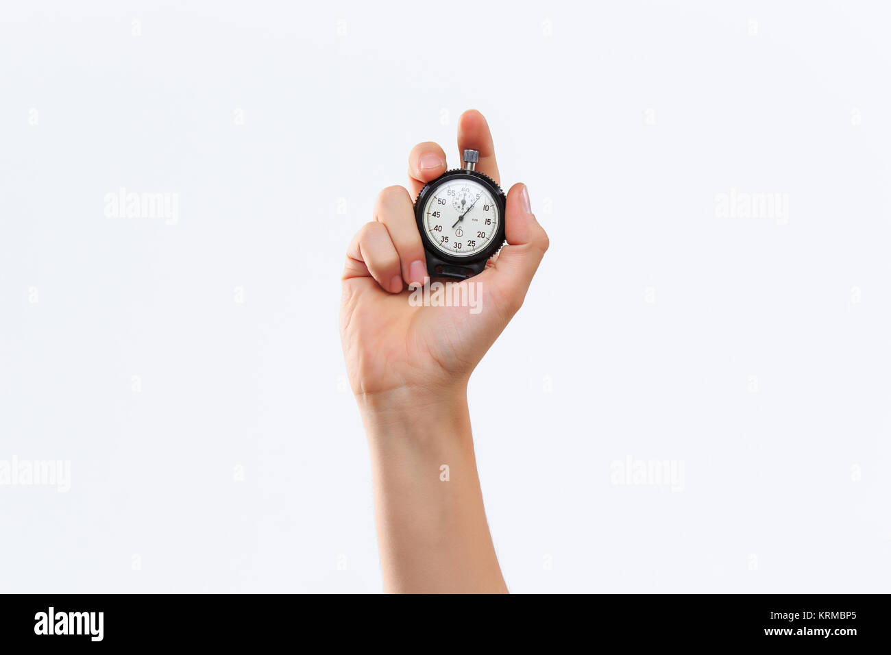 hand holding a stopwatch against a white background Stock Photo - Alamy