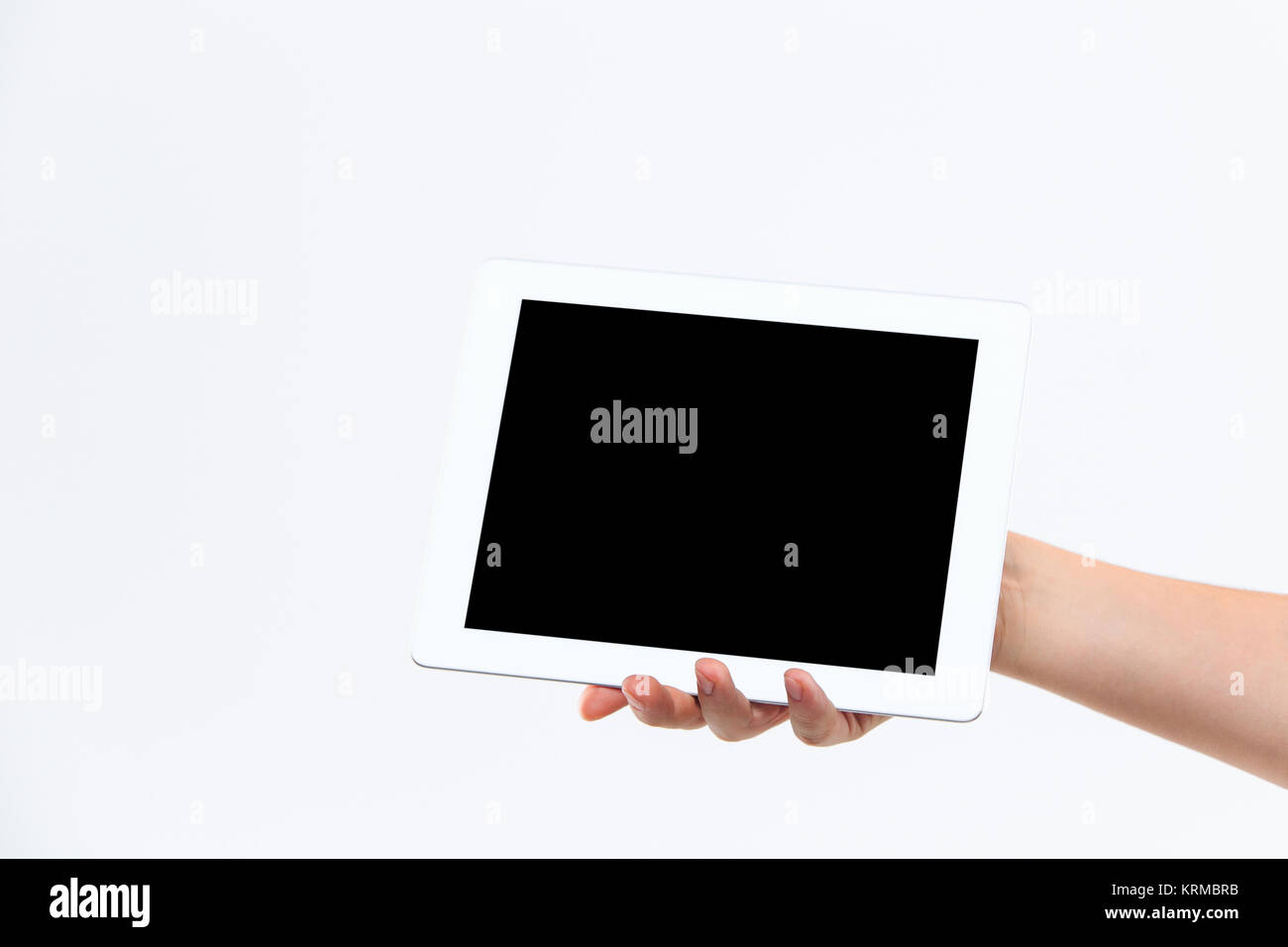 Human hand holding tablet Stock Photo - Alamy