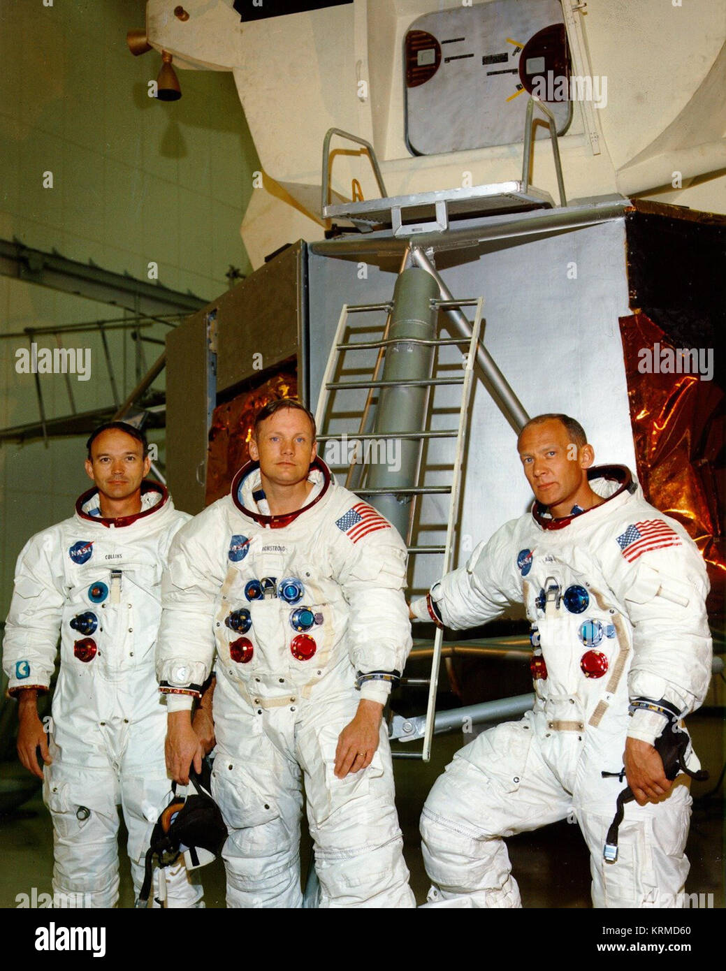 Mike Collins, Neil Armstrong, and Buzz Aldrin (left to right) pose in ...