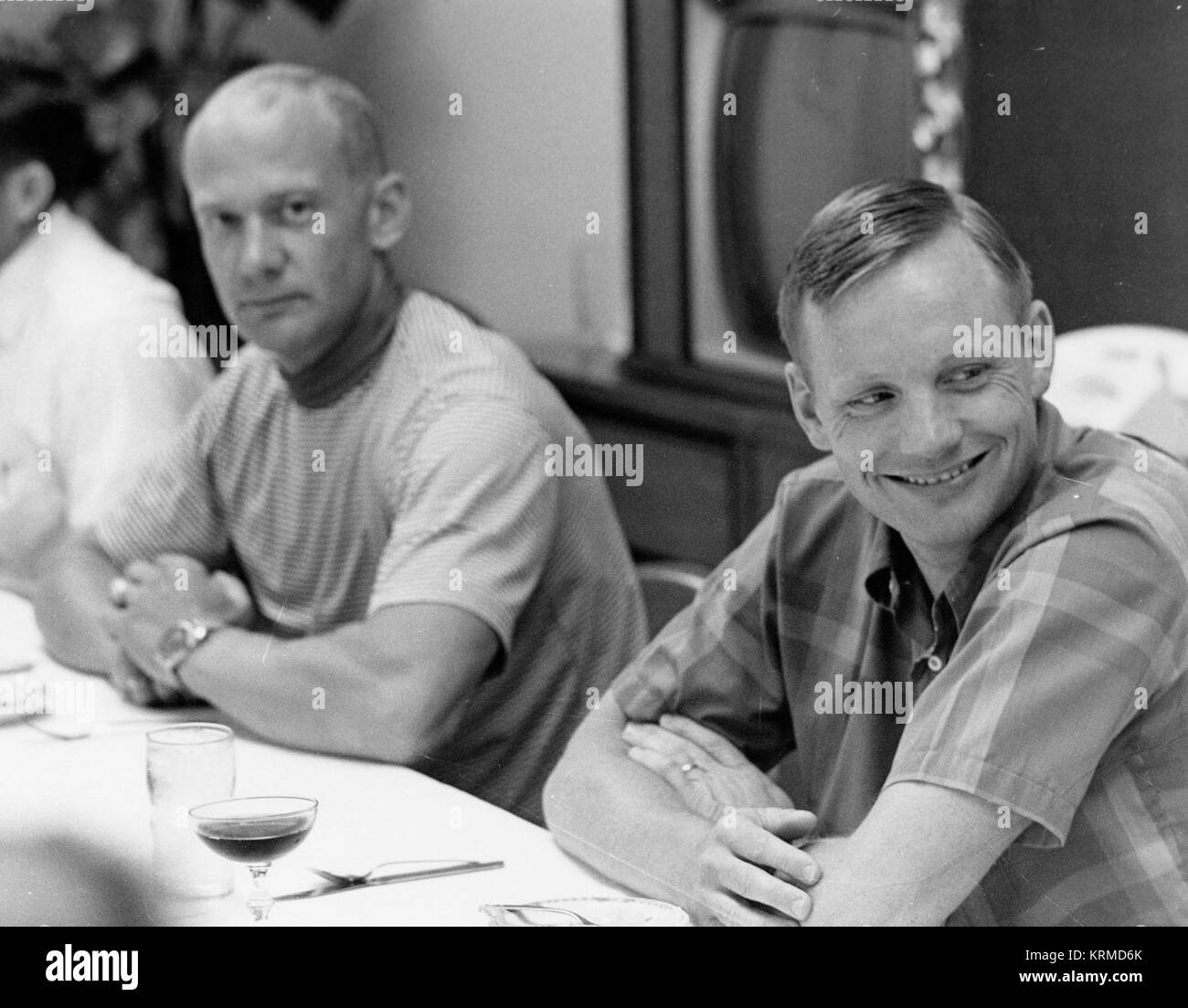 Buzz Aldrin (left) and Neil Armstrong at supper in crew quarters on the ...