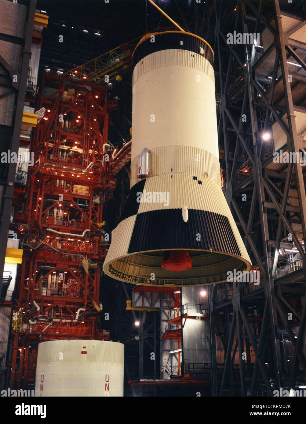 The S-IVB third stage being hoisted into position for mating with the ...