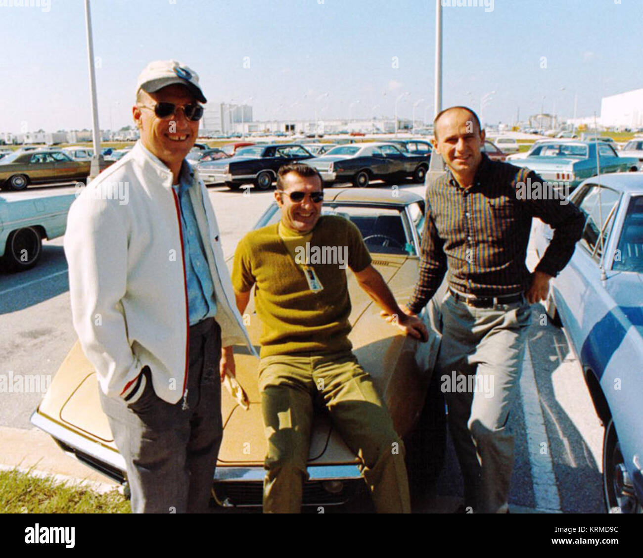 Pete Conrad (left), Dick Gordon, and Al Bean pose with one of their ...
