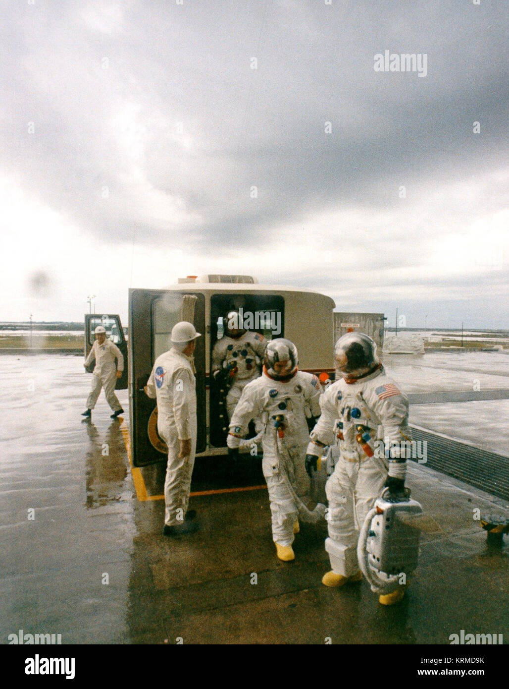 The Apollo 12 crew leaves the transfer van at the pad prior to launch ...