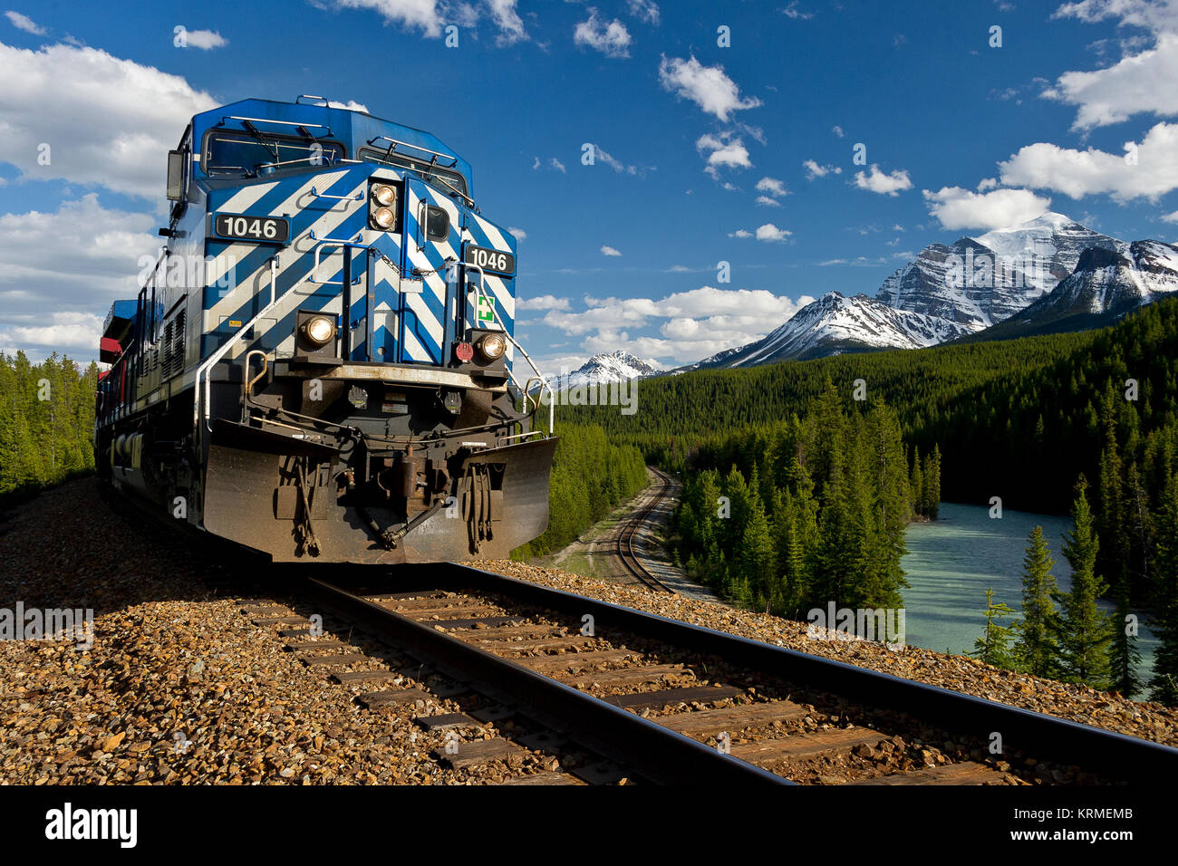 CPR grain train westbound loco CEFX 1046 on north track at Lake Louise ...