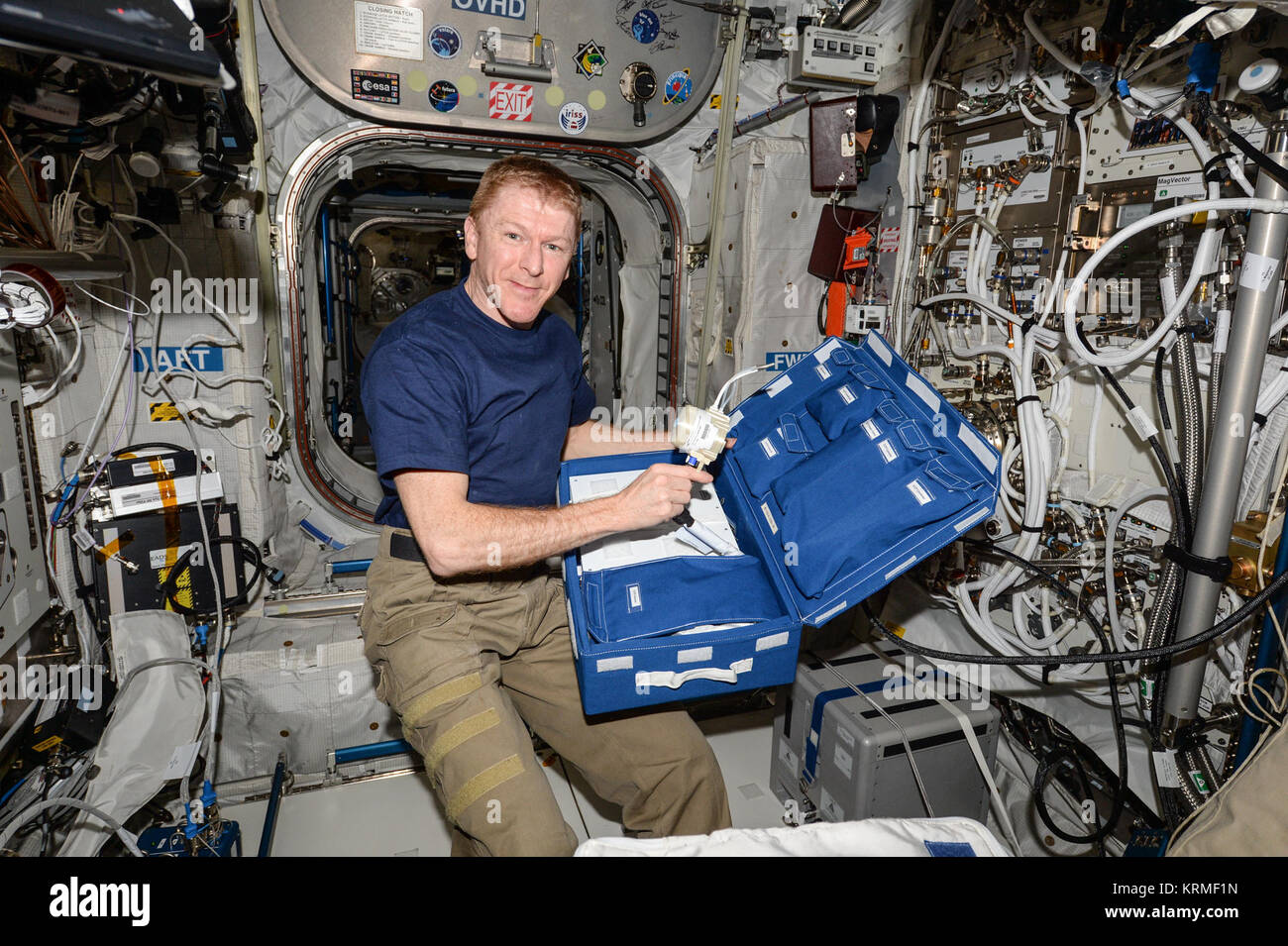 ISS-47 Tim Peake unpacks an analyzer in the Columbus module Stock Photo ...