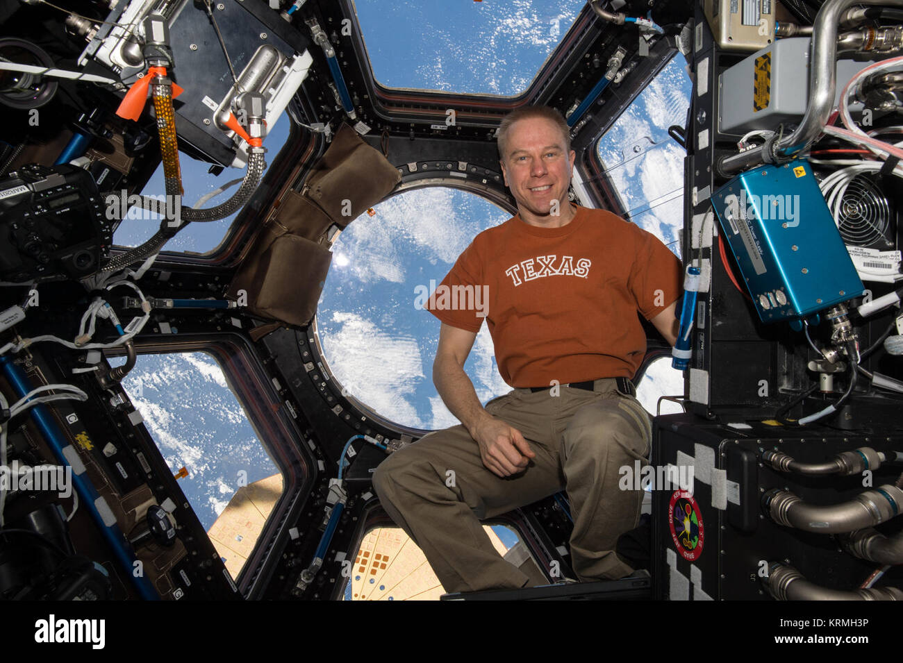 ISS-47 Tim Kopra inside the cupola module Stock Photo - Alamy