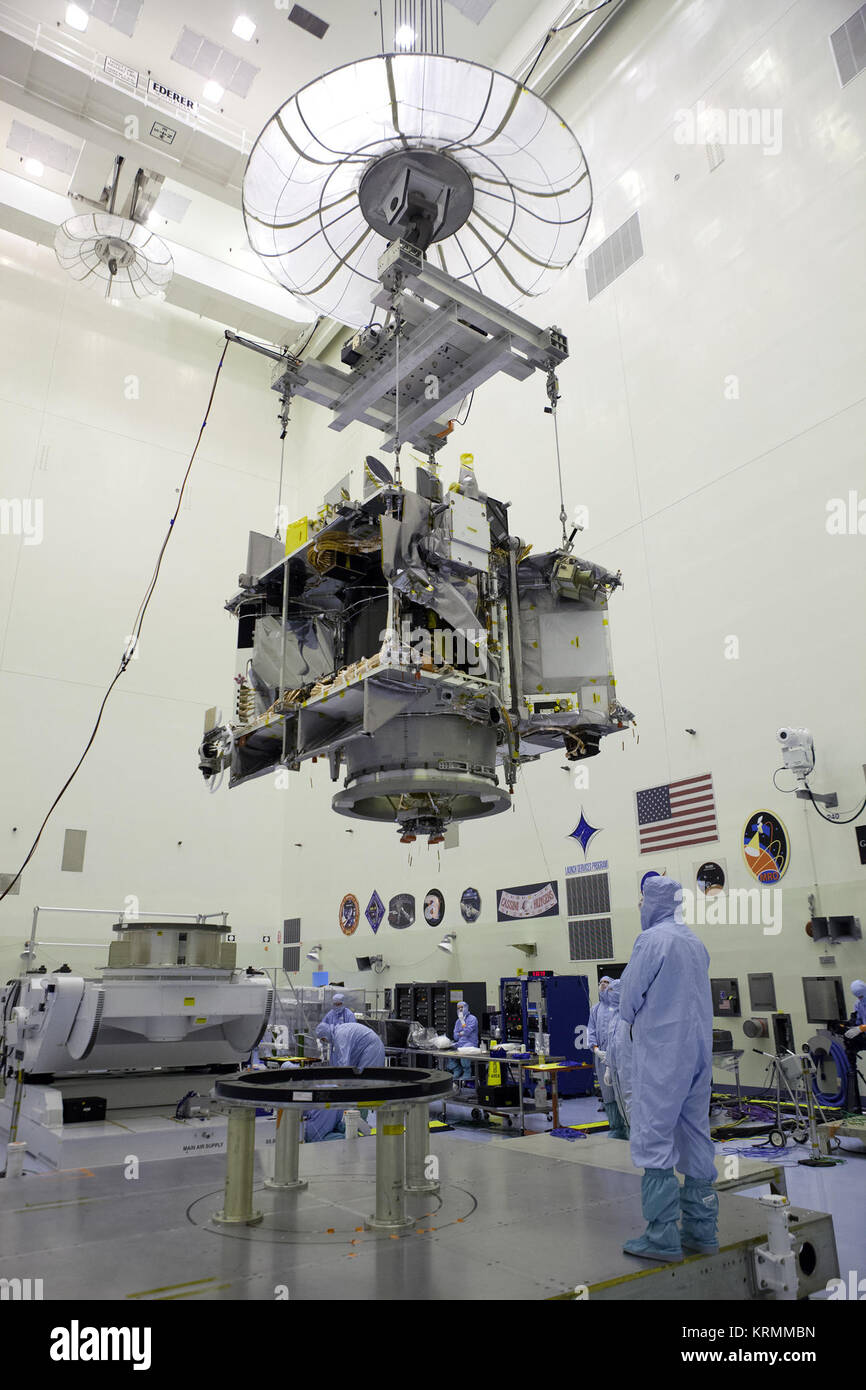 OSIRIS-REx being hoisted on rotation stand and rotated downwards inside ...